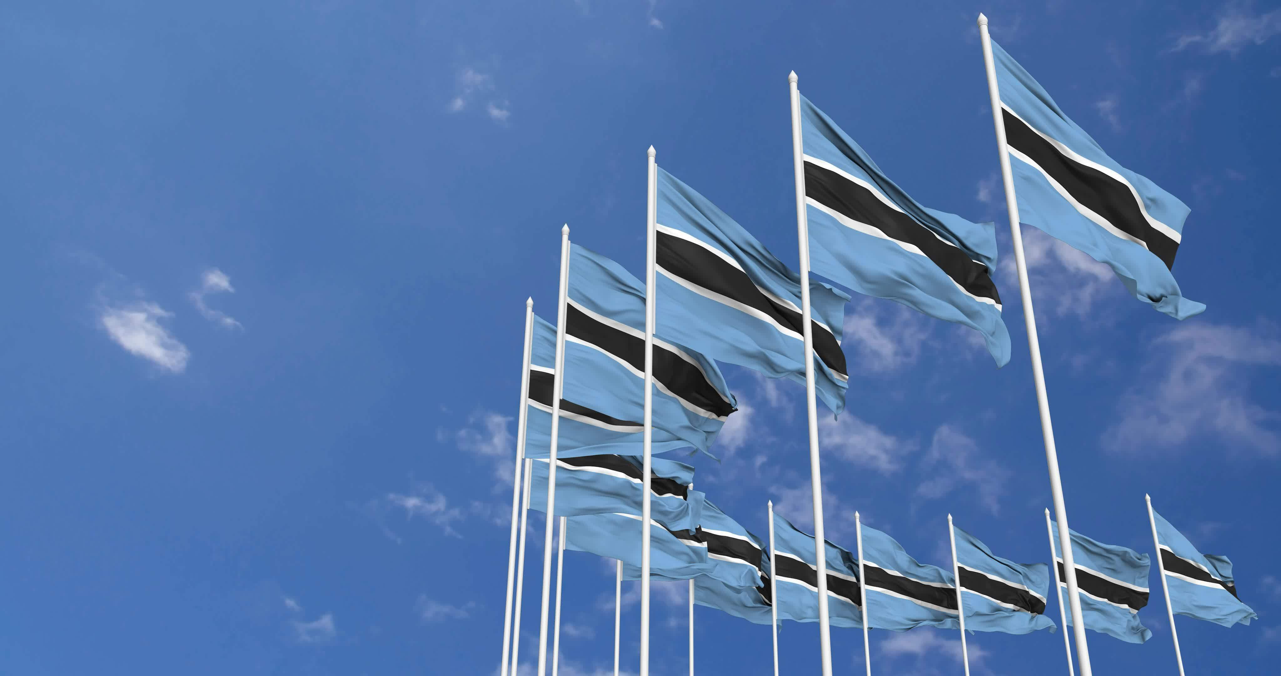 Botswana Flags Waving in the Sky, Seamless Loop in Wind, Space on Left Side for Design or ...