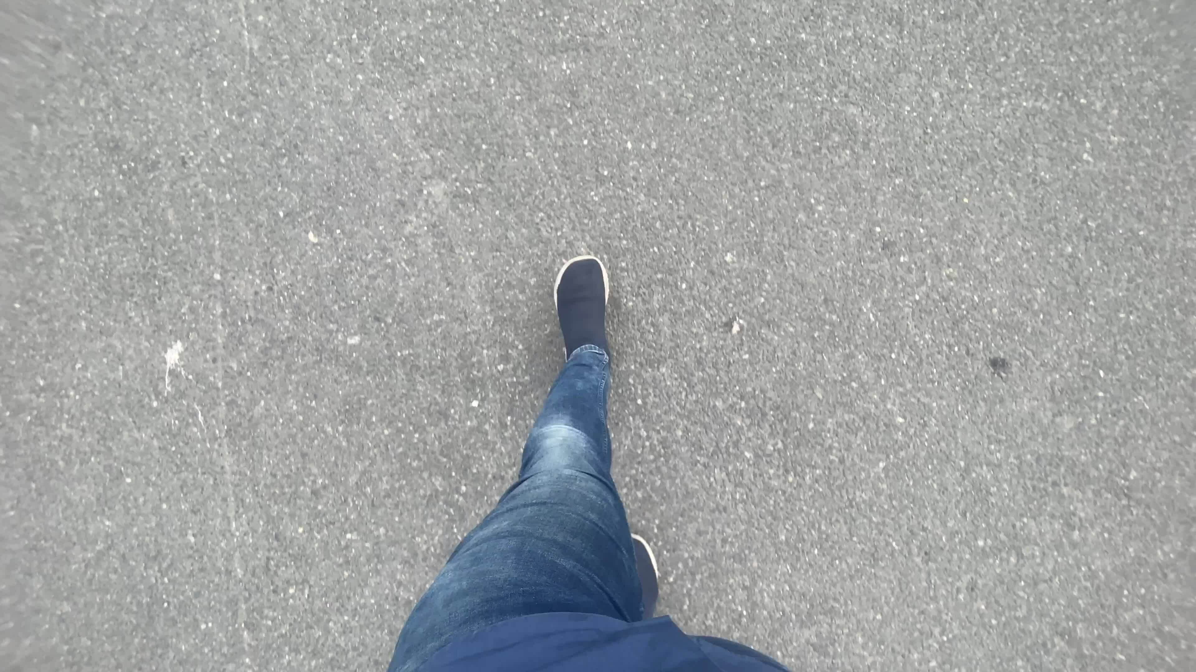 POV shot of man in shoe walking on road 35590659 Stock Video at Vecteezy