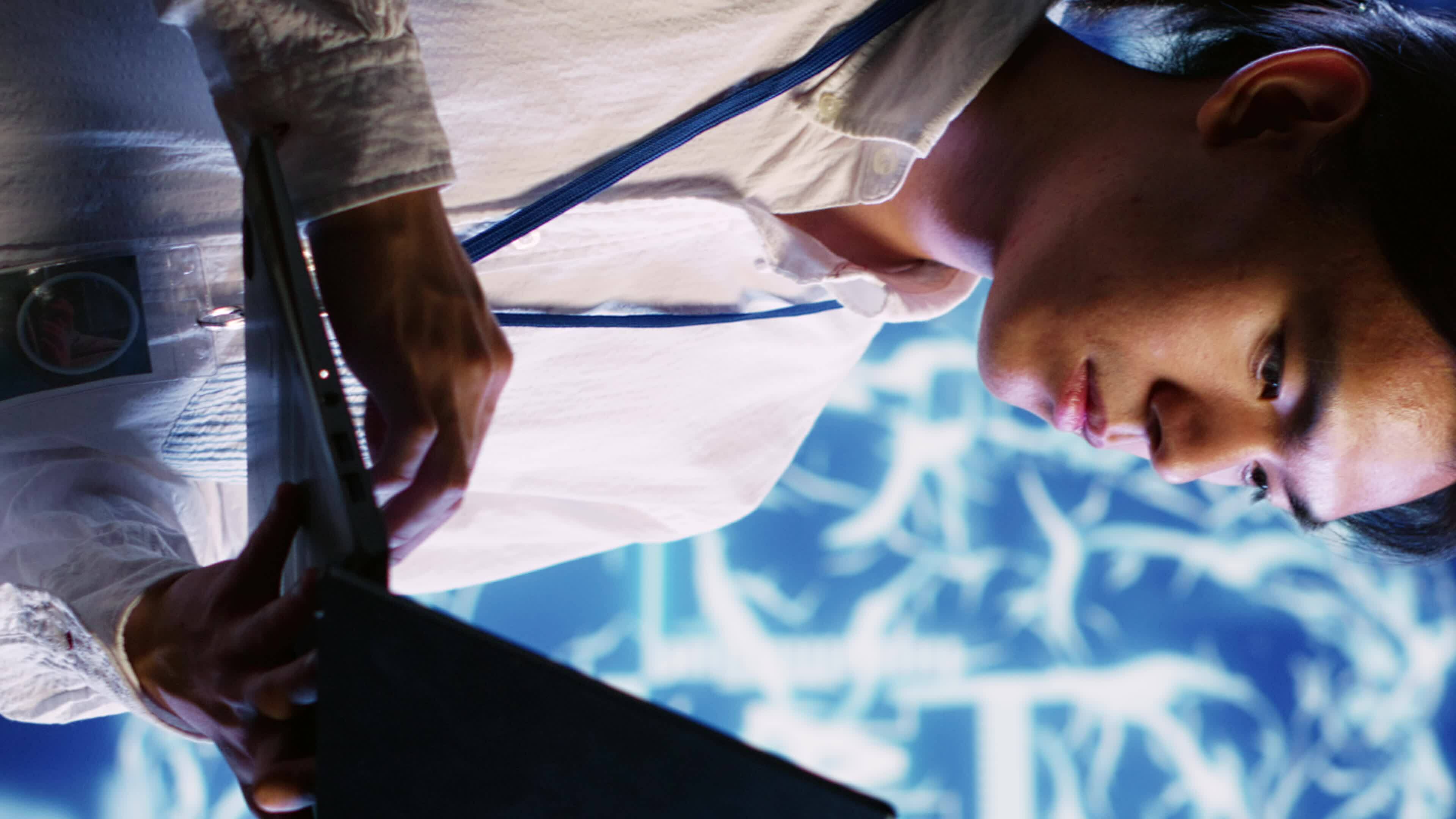 Vertical Video It Practitioner Works With Artificial Intelligence Computerized Model Simulating