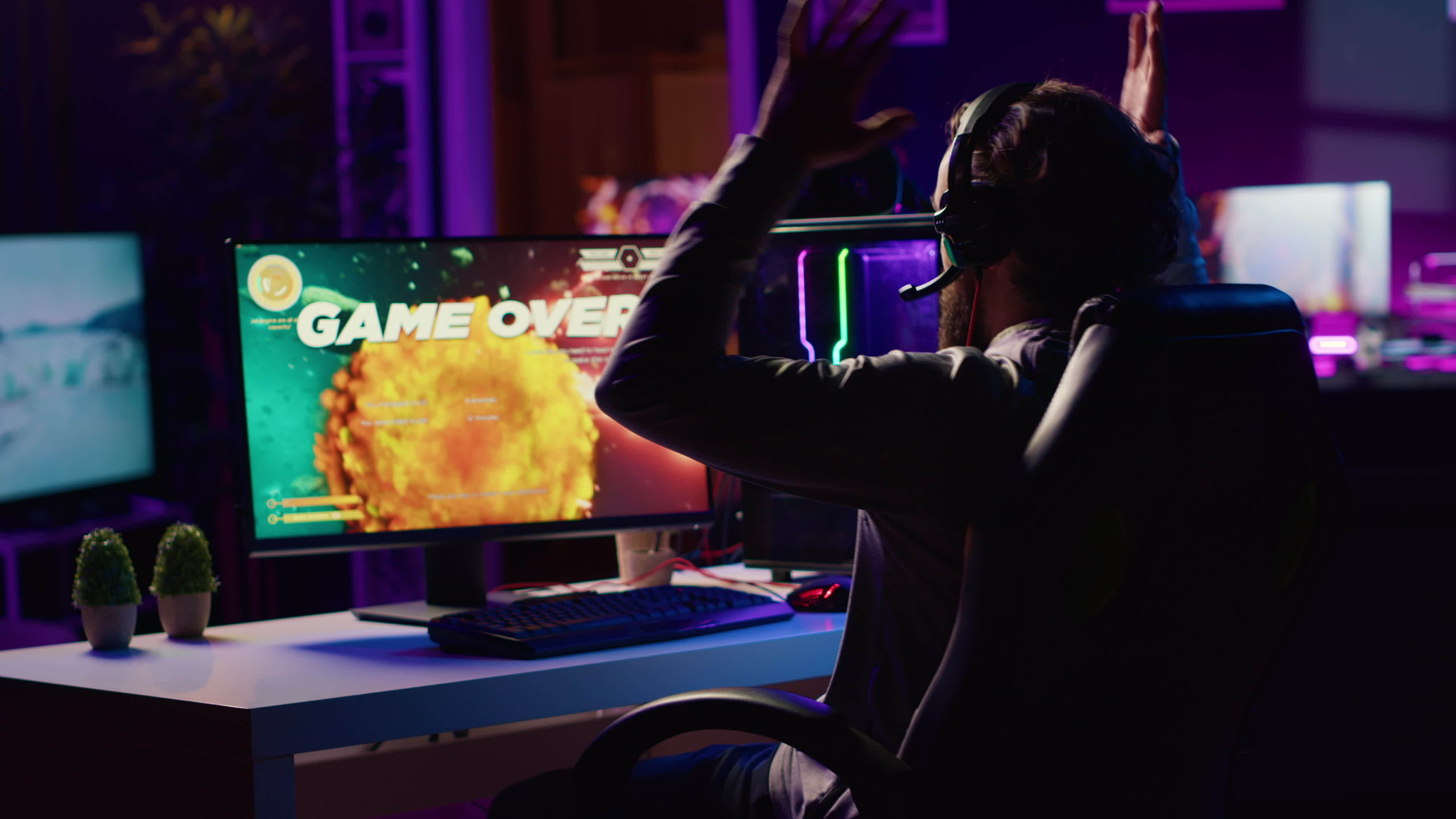 Upset Gamer Hitting Desk In Frustration After Receiving Game Over