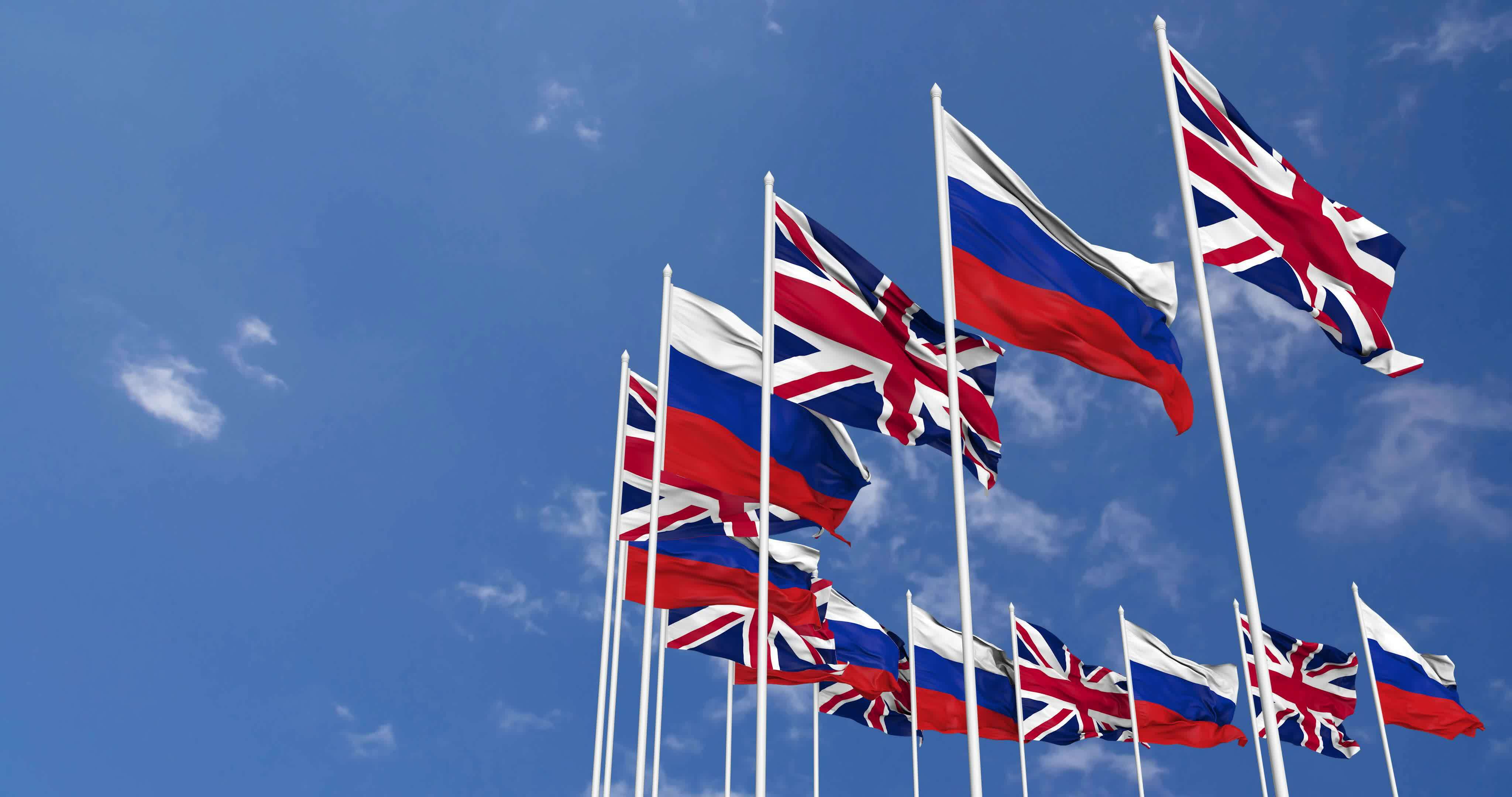Russia and United Kingdom Flags Waving Together in the Sky, Seamless ...