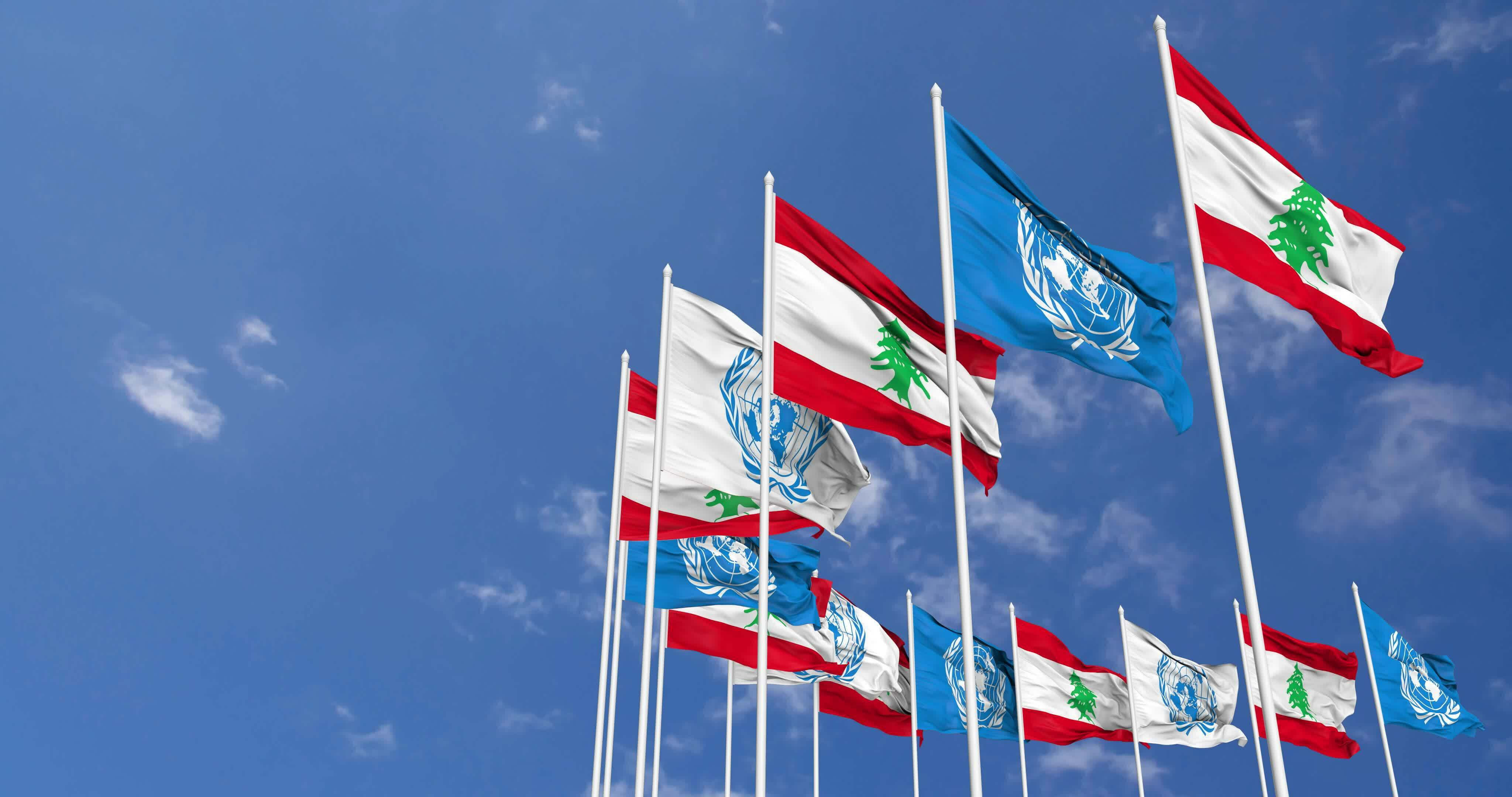 Lebanon and United Nations, UN Flags Waving Together in the Sky, Seamless Loop in Wind, Space on ...