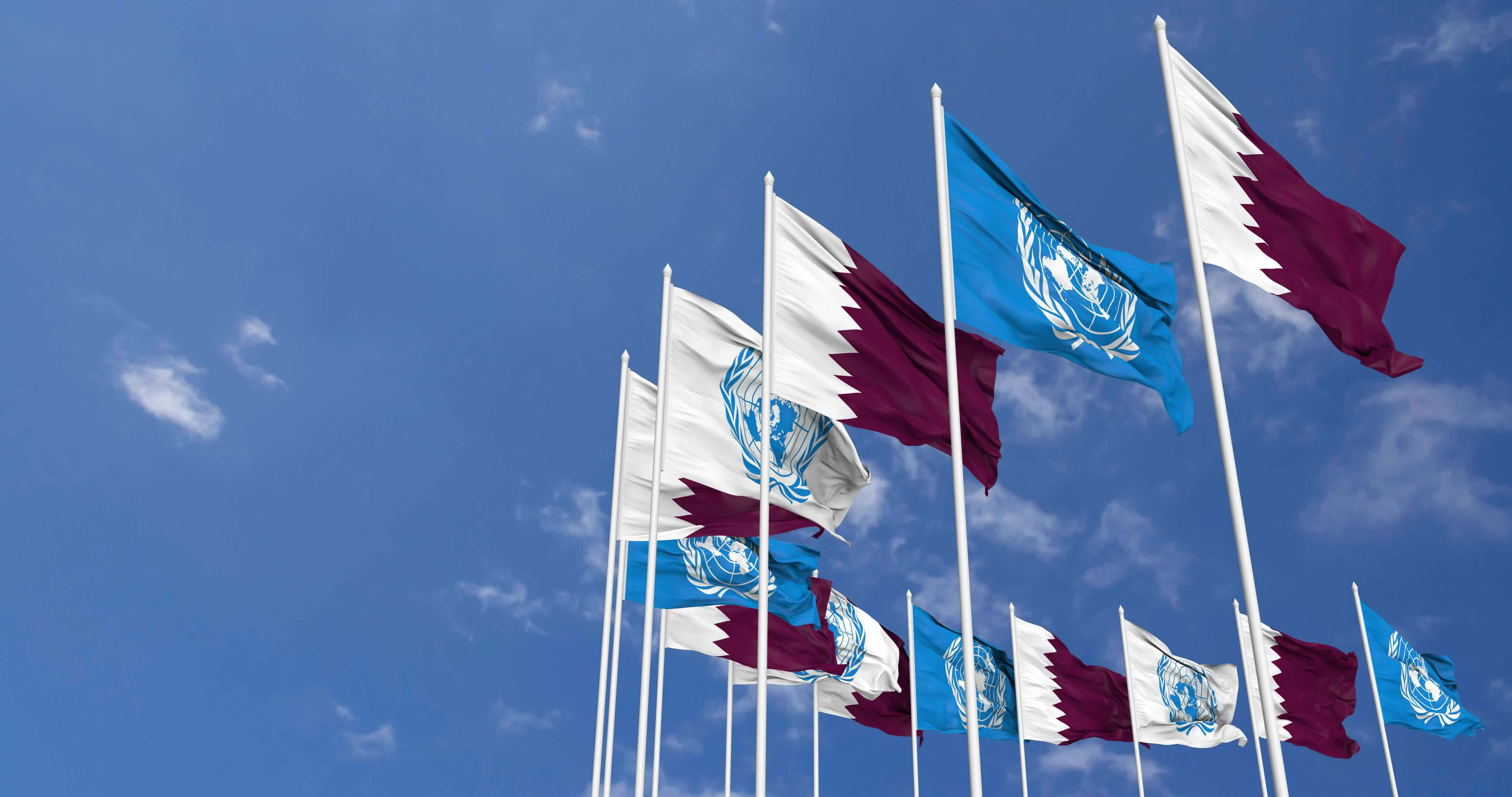Qatar and United Nations, UN Flags Waving Together in the Sky, Seamless Loop in Wind, Space on ...