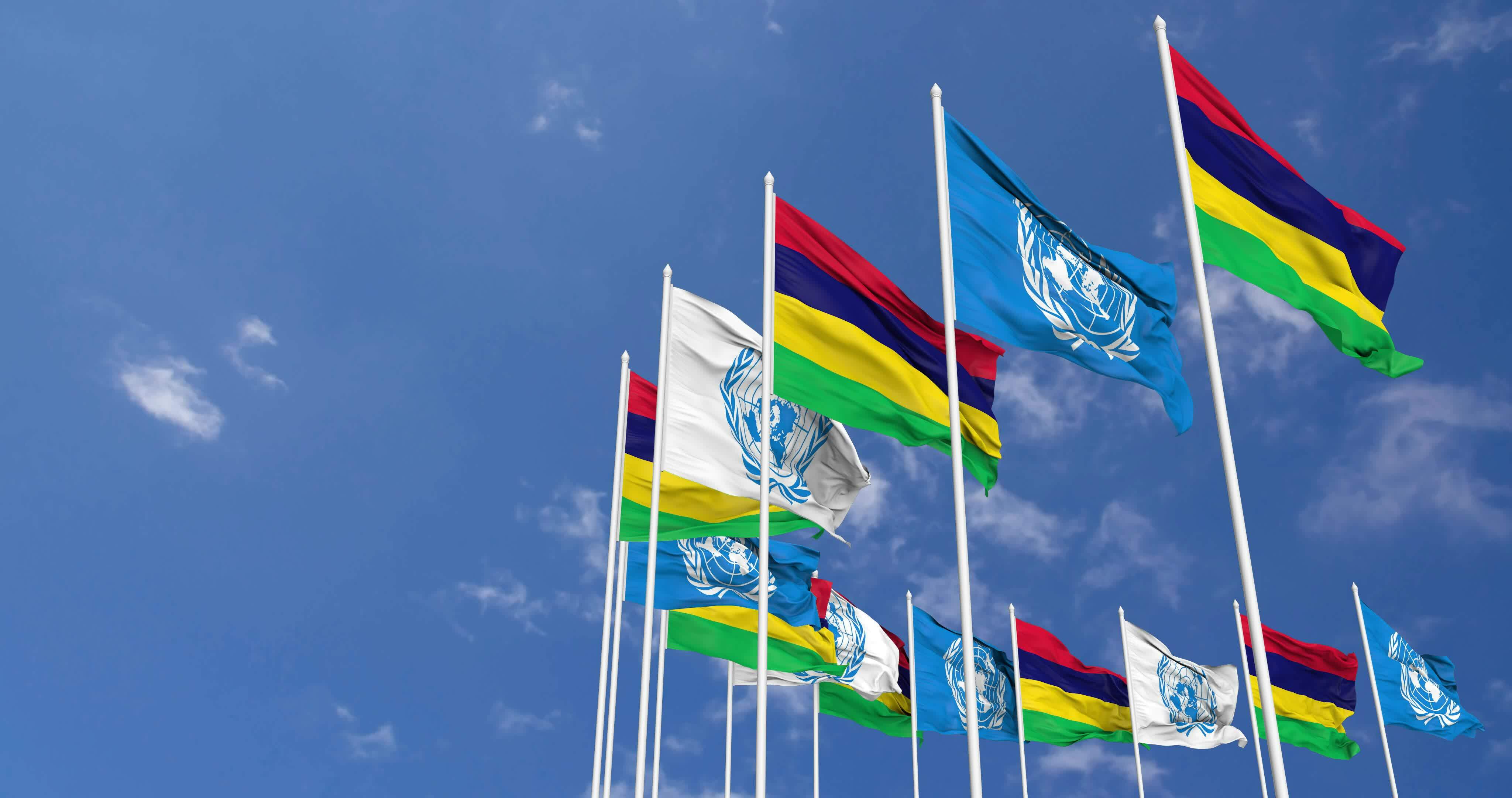 Mauritius and United Nations, UN Flags Waving Together in the Sky, Seamless Loop in Wind, Space ...