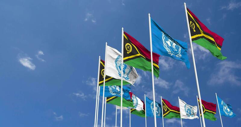Vanuatu and United Nations, UN Flags Waving Together in the Sky, Seamless Loop in Wind, Space on ...