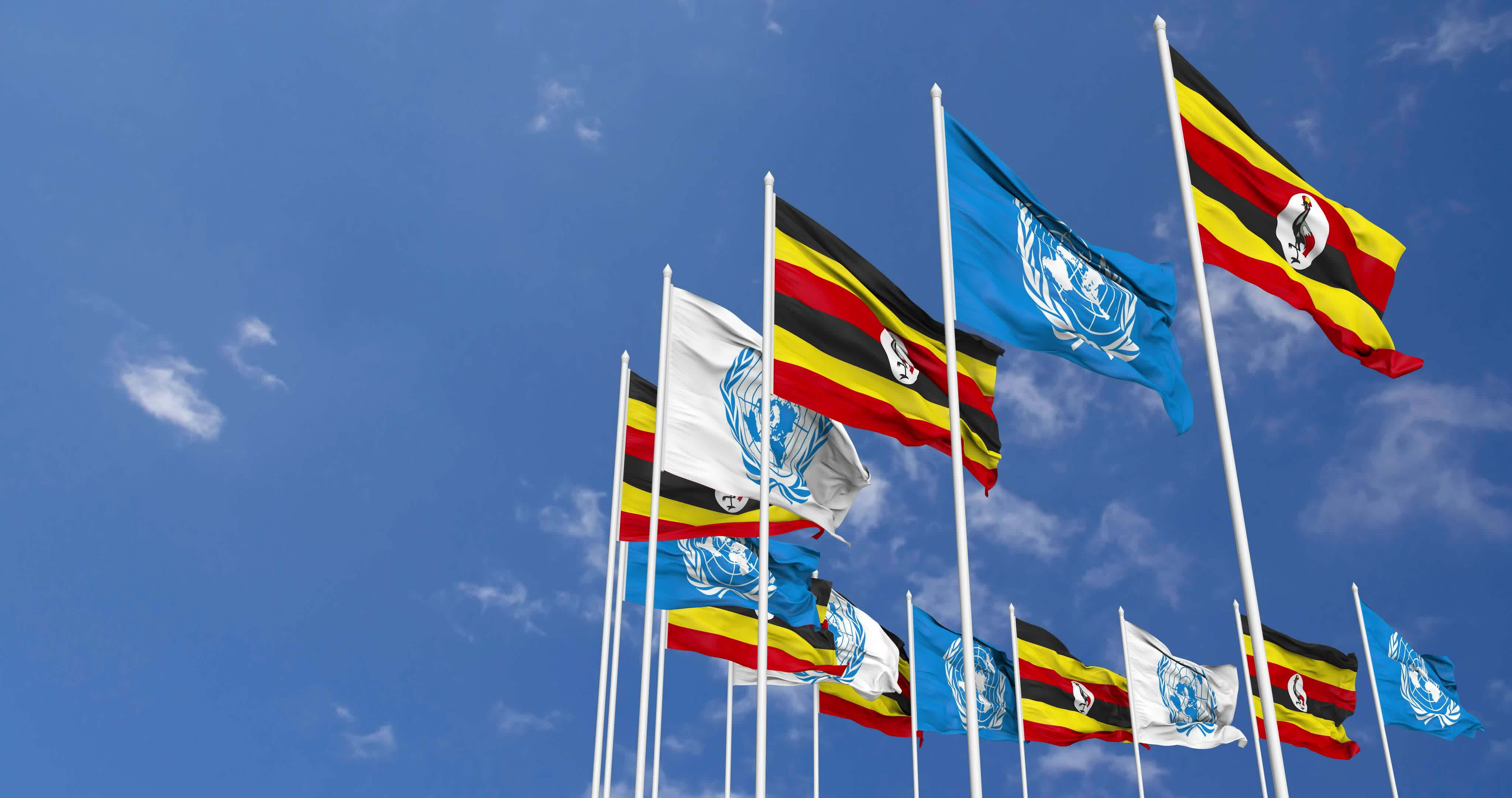 Uganda and United Nations, UN Flags Waving Together in the Sky, Seamless Loop in Wind, Space on ...