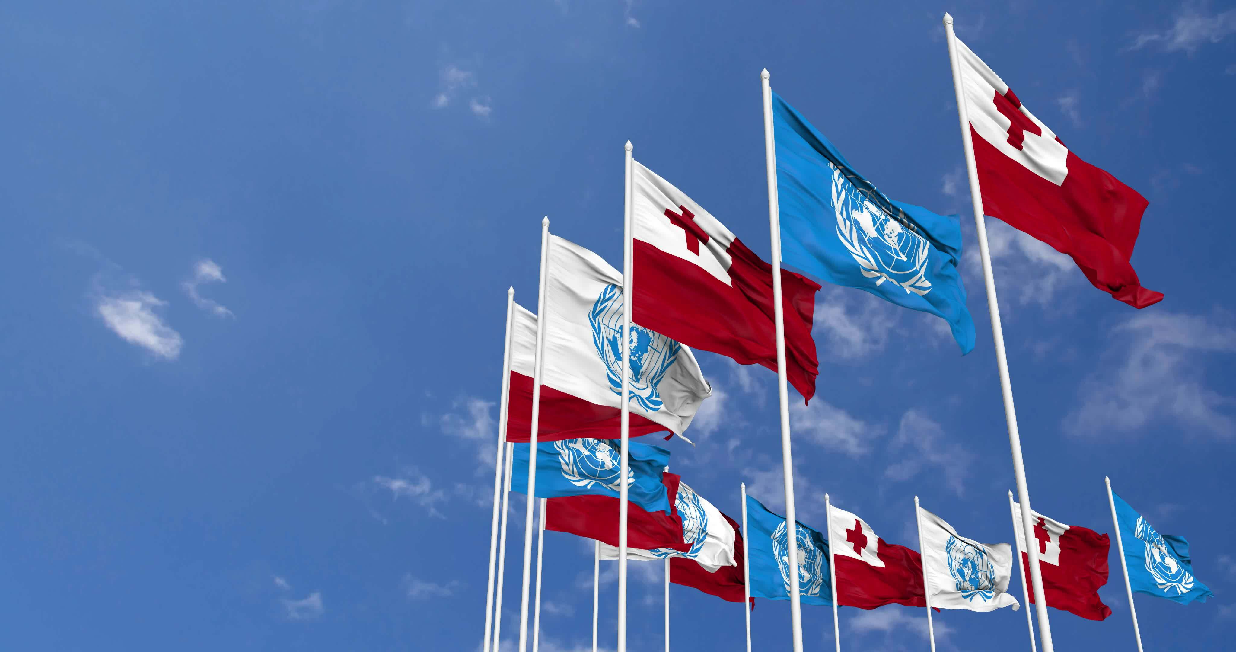 Tonga and United Nations, UN Flags Waving Together in the Sky, Seamless Loop in Wind, Space on ...