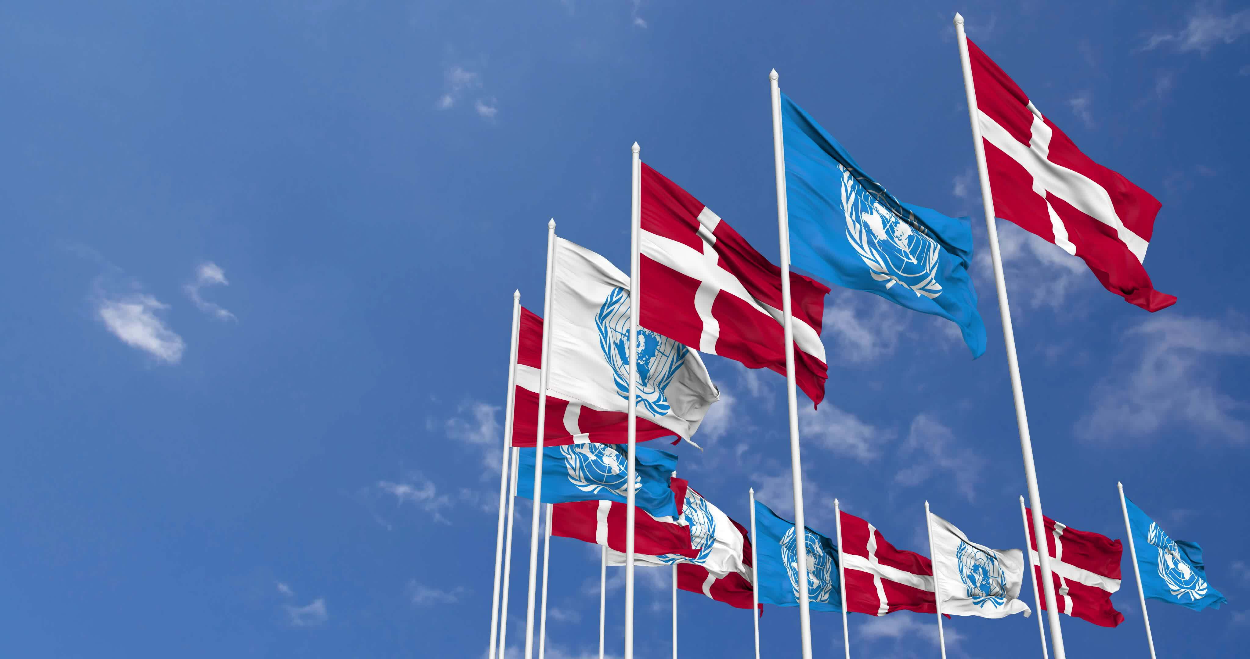 Denmark and United Nations, UN Flags Waving Together in the Sky, Seamless Loop in Wind, Space on ...