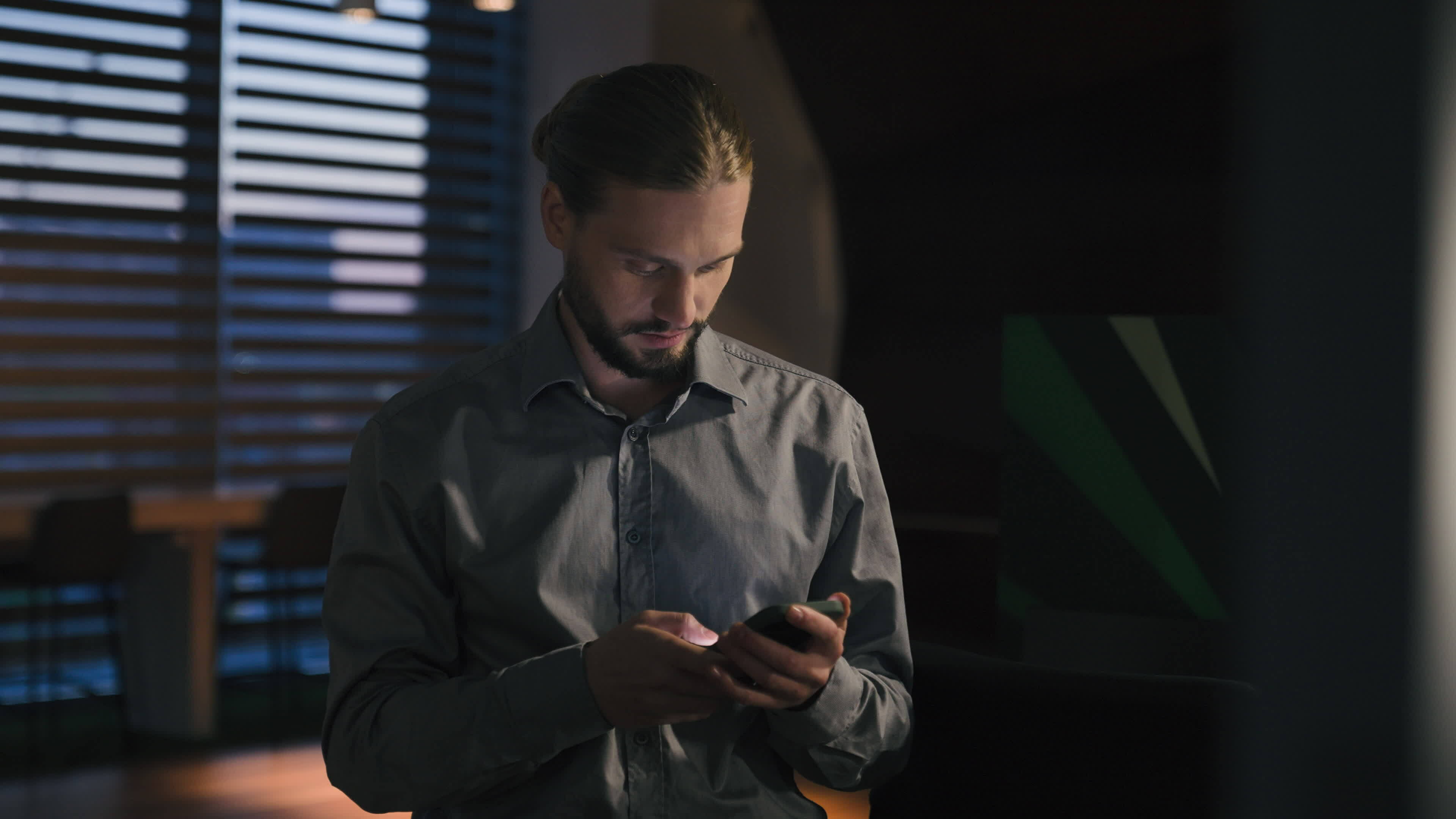 Man Scrolling Phone Stock Video Footage for Free Download