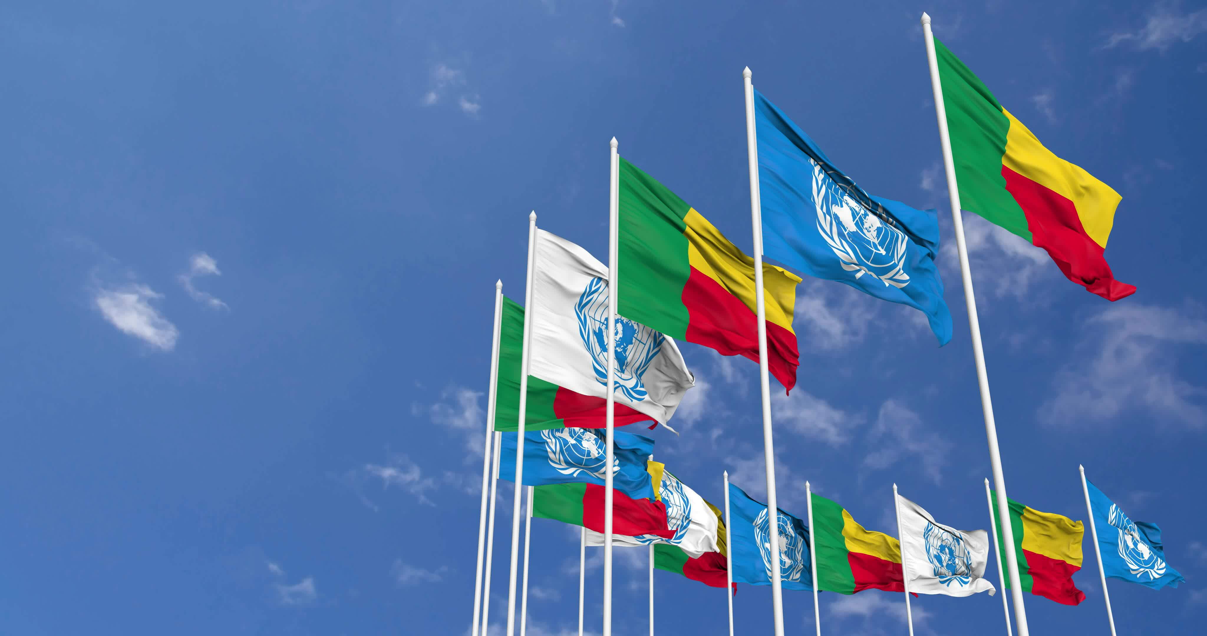 Benin and United Nations, UN Flags Waving Together in the Sky, Seamless Loop in Wind, Space on ...