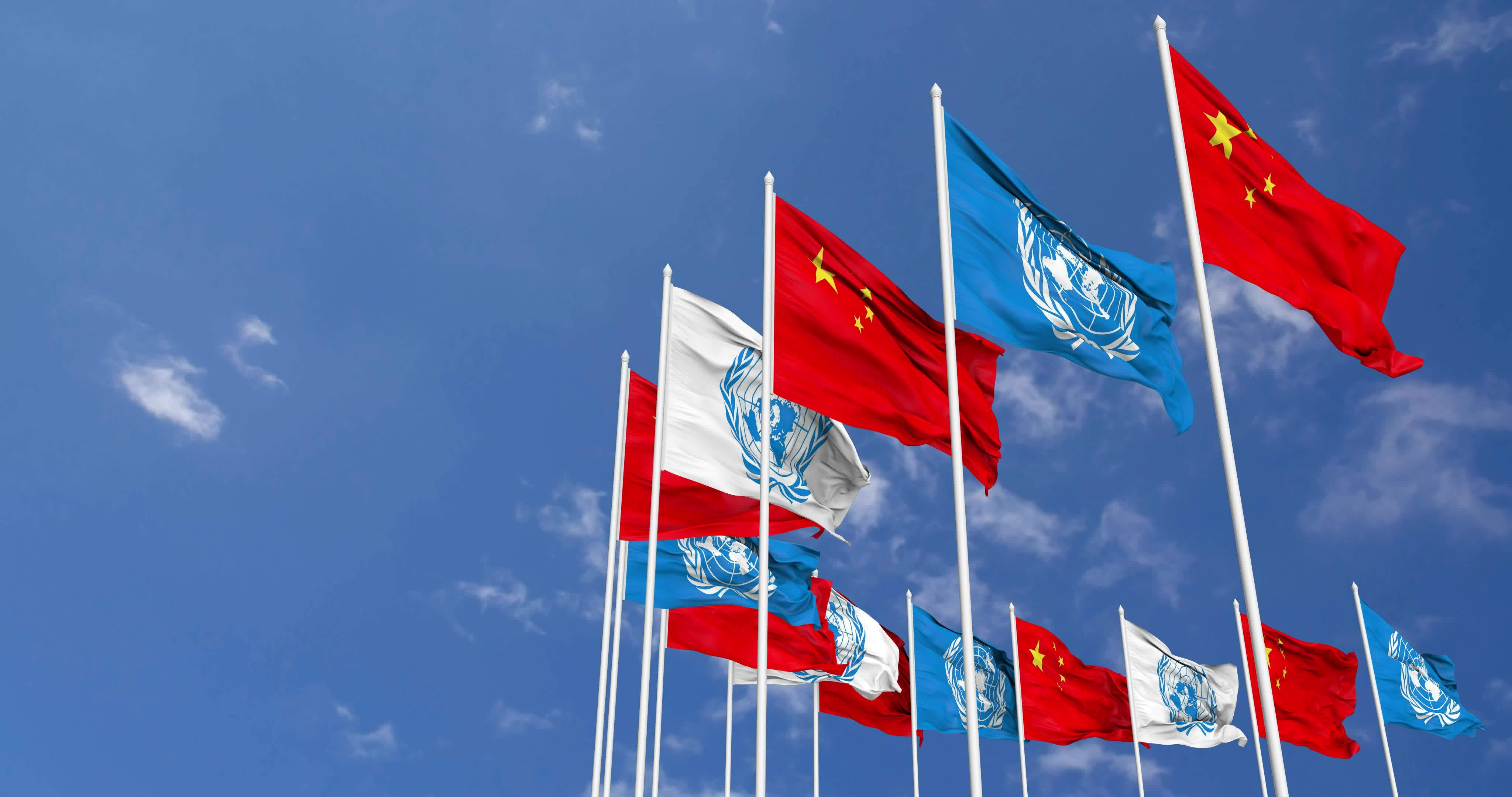 China and United Nations, UN Flags Waving Together in the Sky, Seamless Loop in Wind, Space on ...