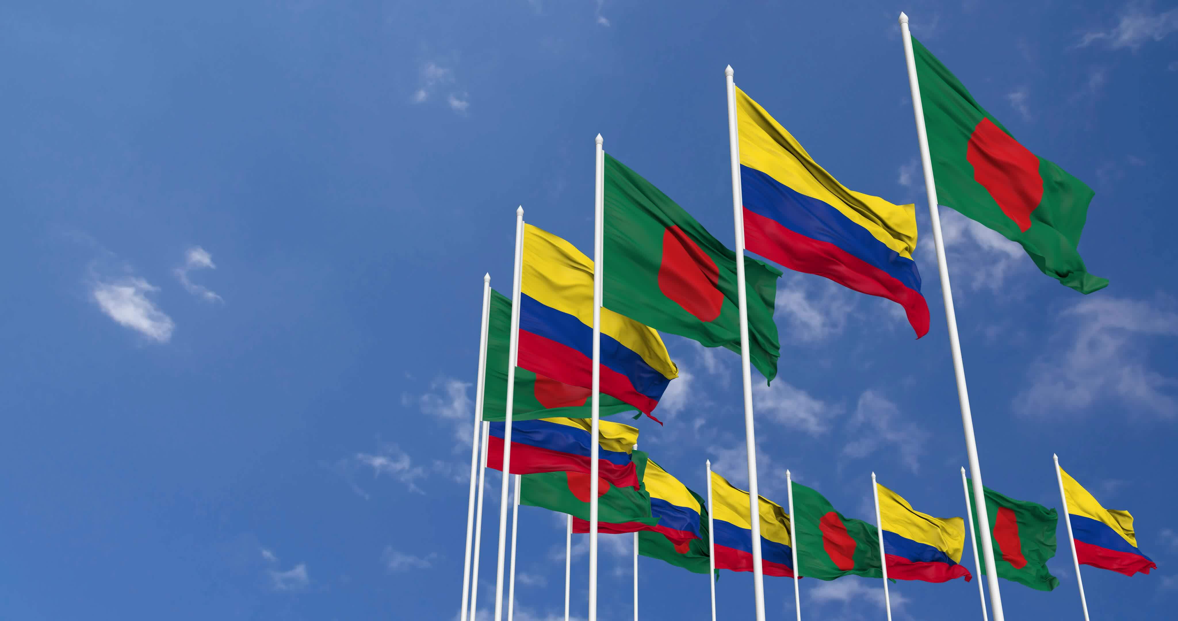 Colômbia e Bangladesh bandeiras acenando juntos dentro a céu, desatado ciclo dentro vento ...