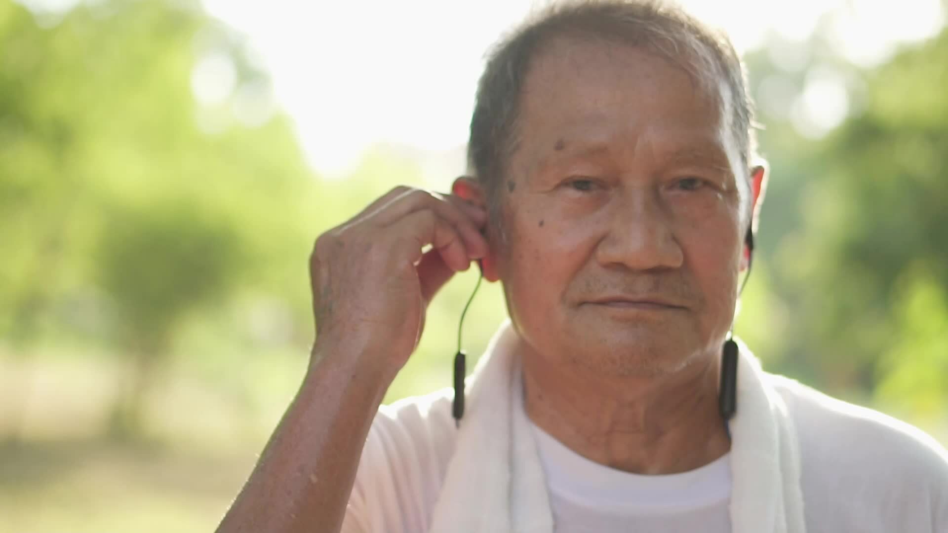 Senior People Wear Headphones To Exercise In The Park 36472221 Stock Video At Vecteezy