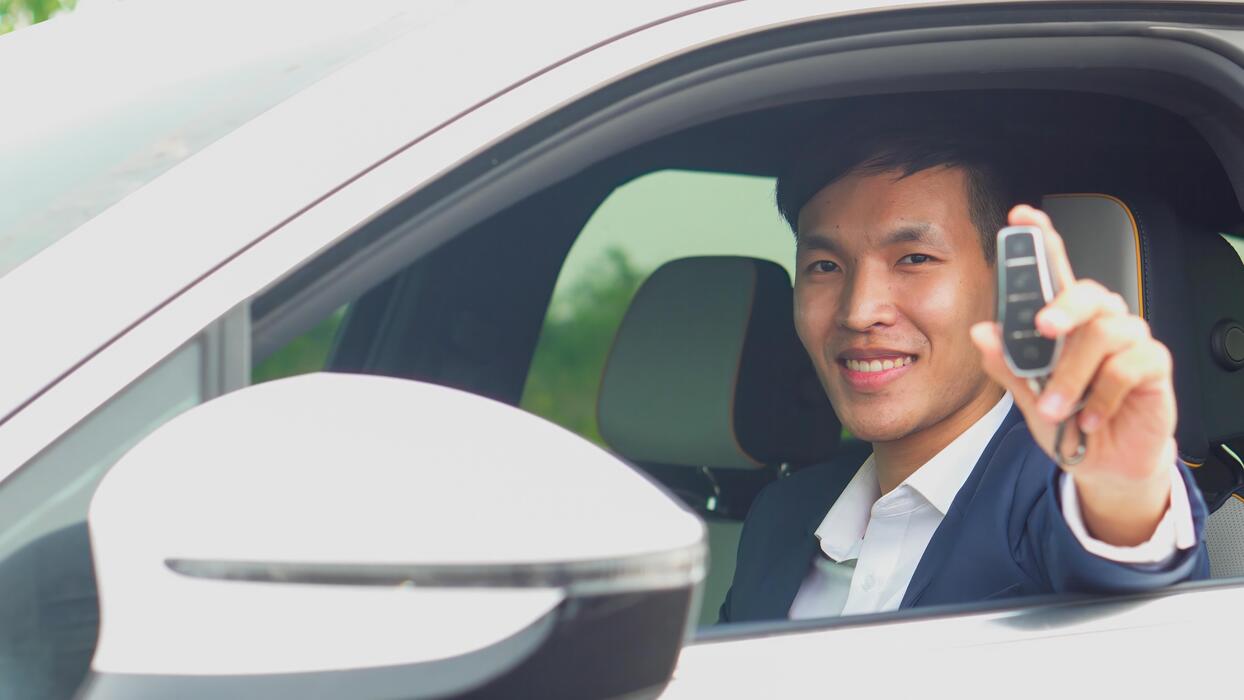 Asian Man Driving Stock Photos, Images and Backgrounds for Free Download