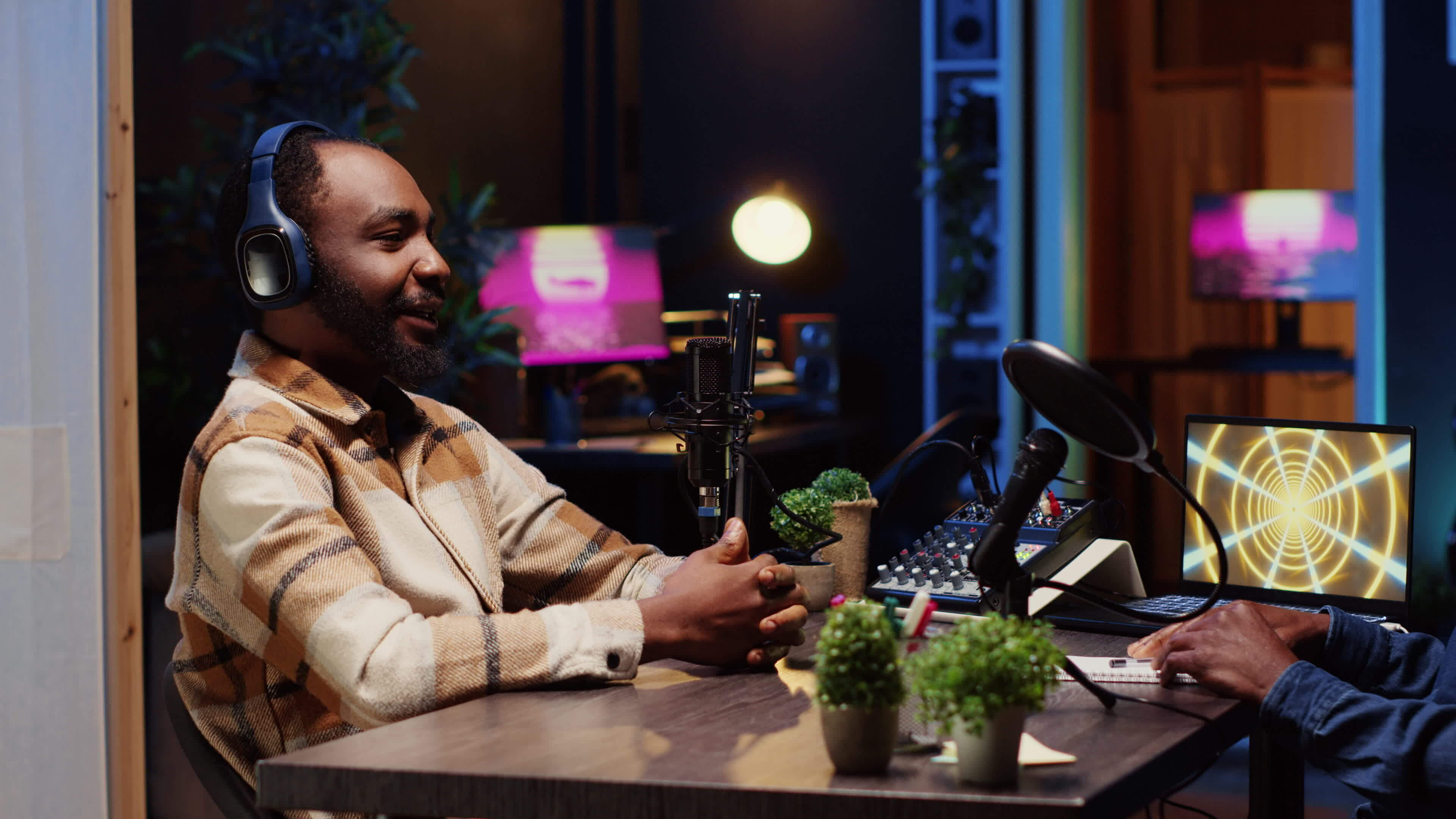 Man hosting podcast, using professional audio equipment to ensure high ...