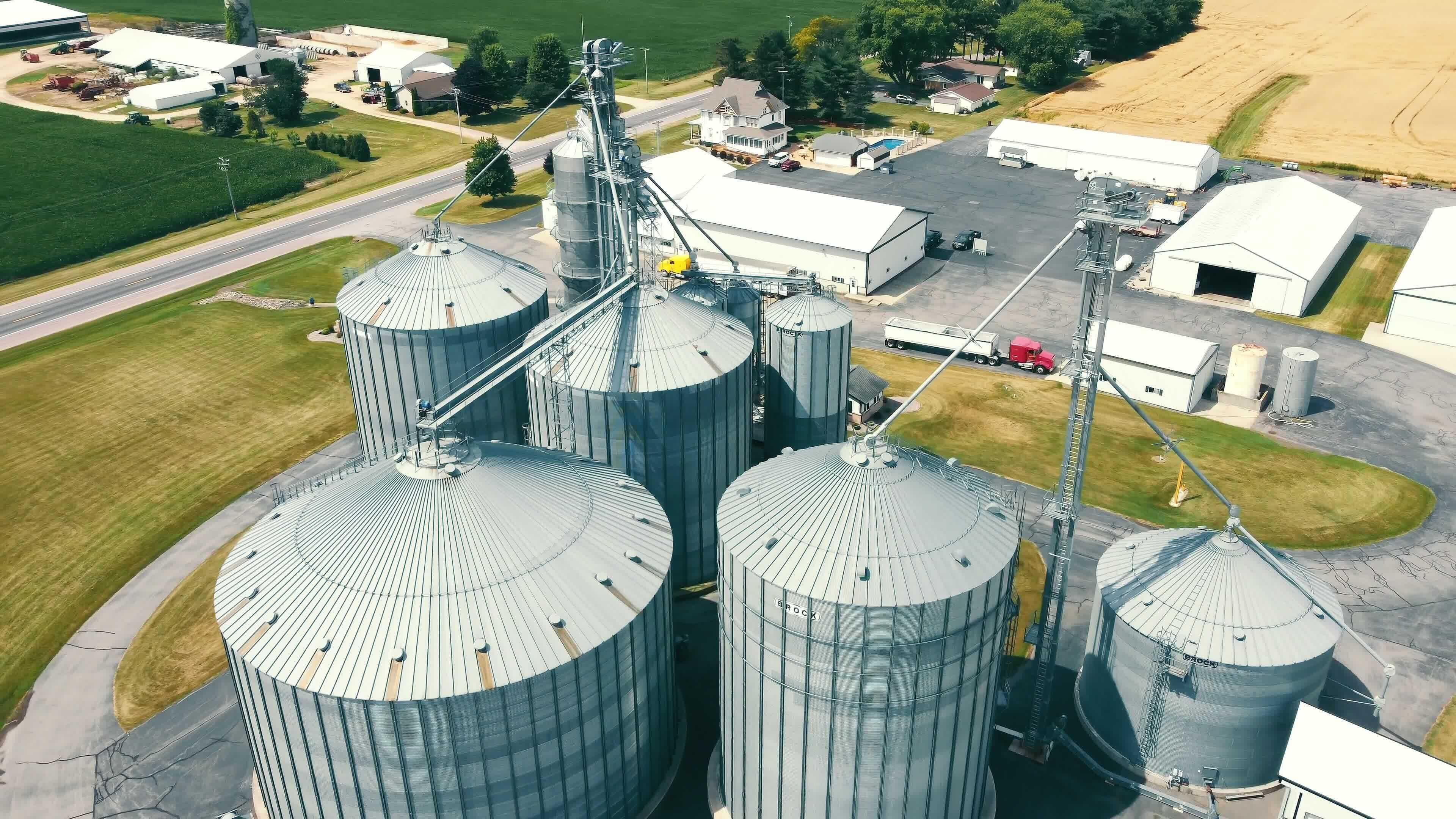 Aerial view of metal silos for grain storage. Modern grain storage ... Aerial view of metal silos for grain storage. Modern grain storage ...