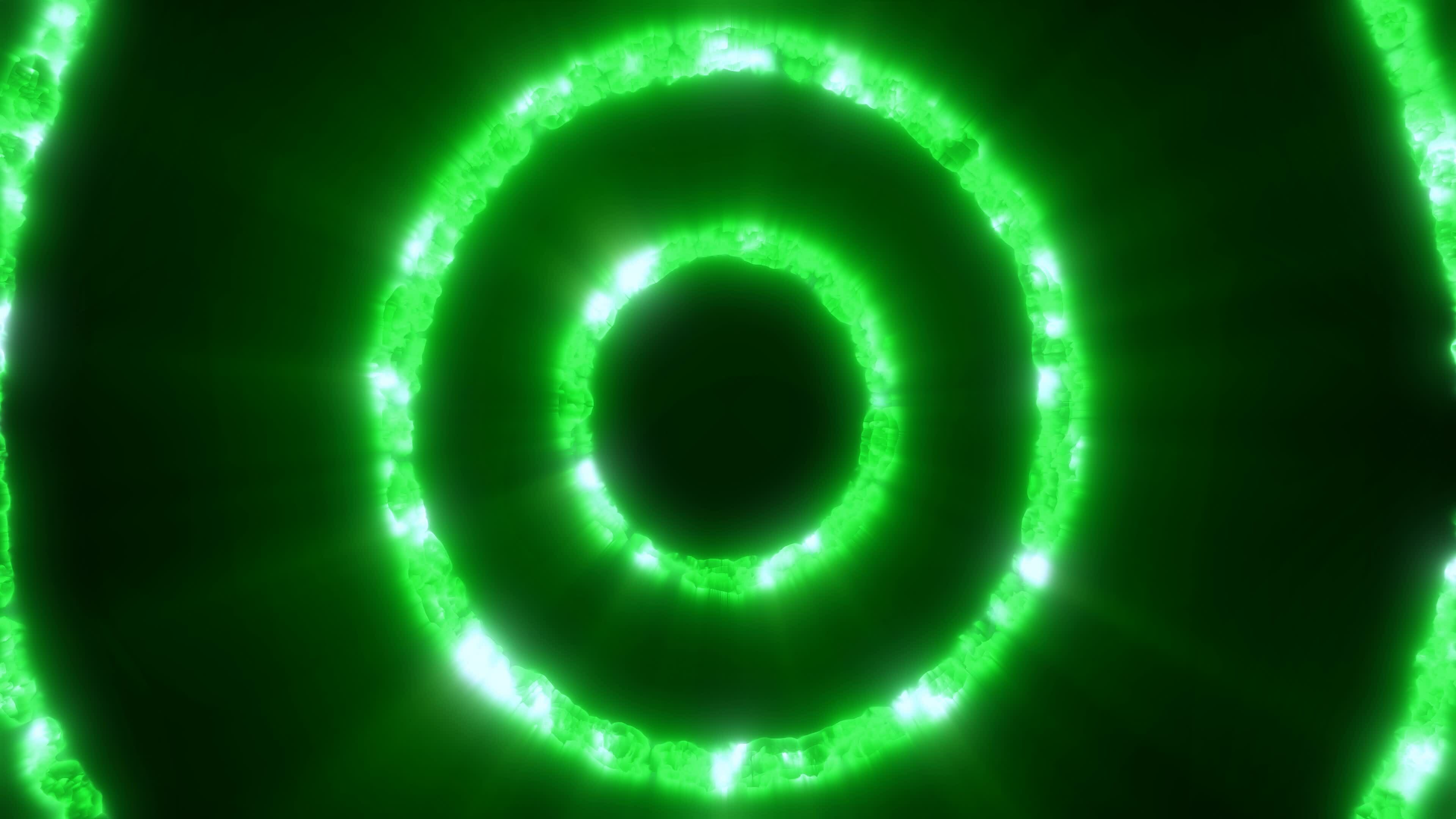 Abstract background looped circles a tunnel of flying green rings of ... Abstract background looped circles a tunnel of flying green rings of ...