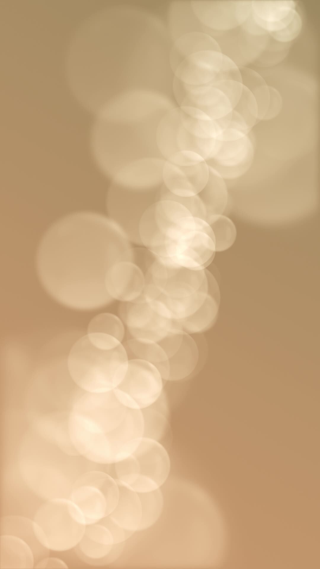 Vertical video - defocused golden bokeh lights background. This elegant motion background ...