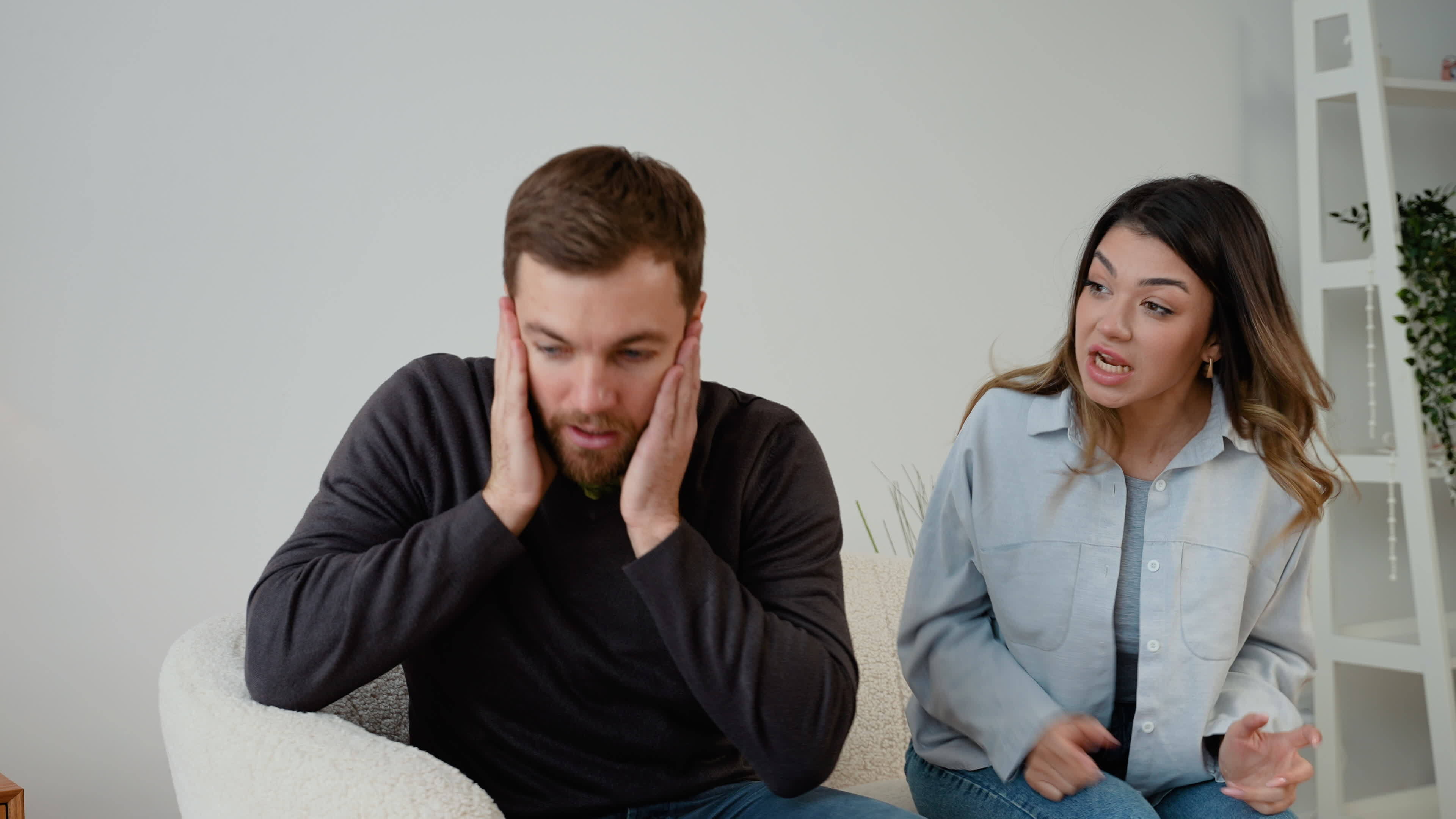 Angry bossy woman and depressed man standing together, wife screaming ...