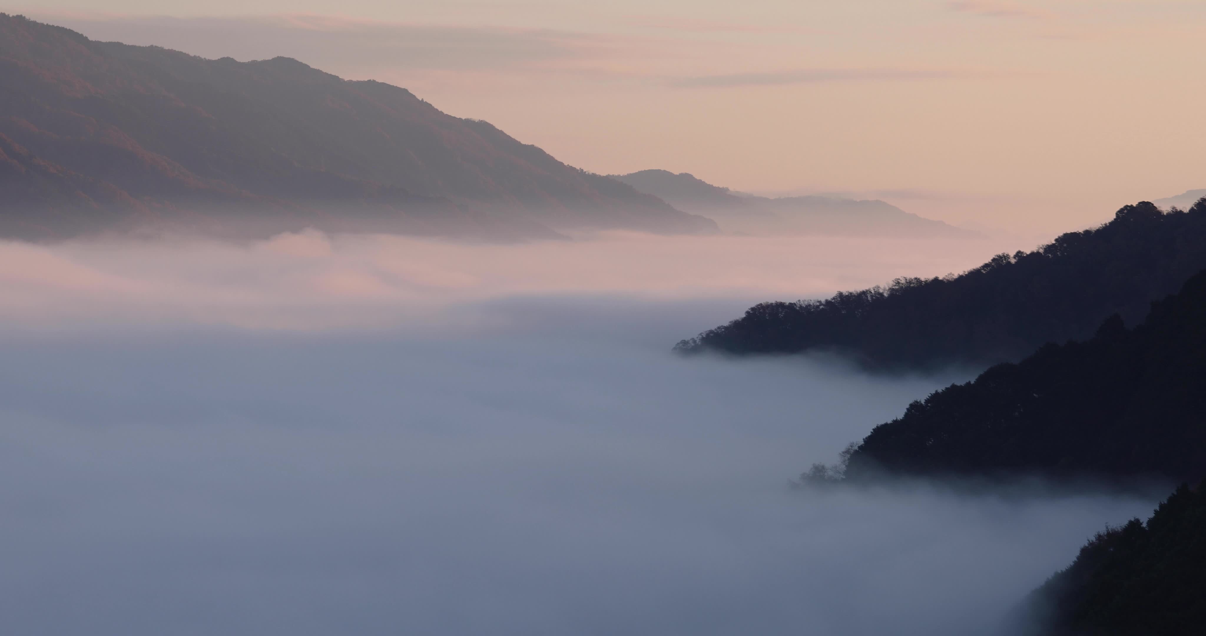 A sea of clouds at the top of the mountain in Kyoto telephoto shot 37765794 Stock Video at Vecteezy