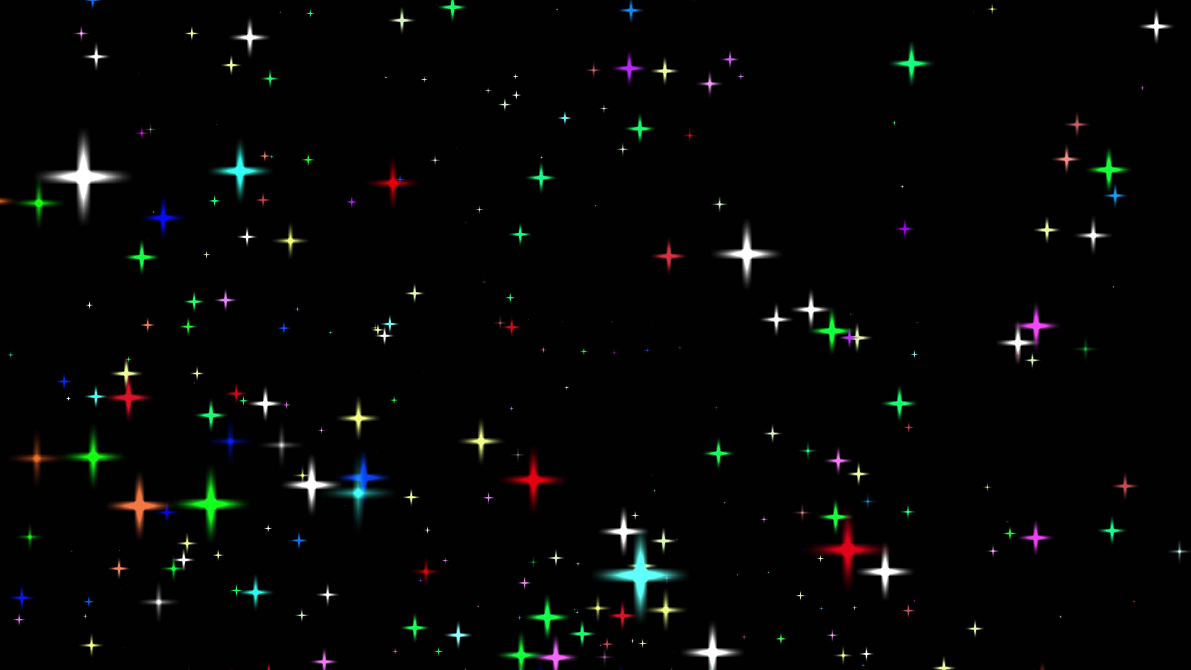 Motion graphics of the twinkle glitter colorful star sparkling behind black background 37766113 ...