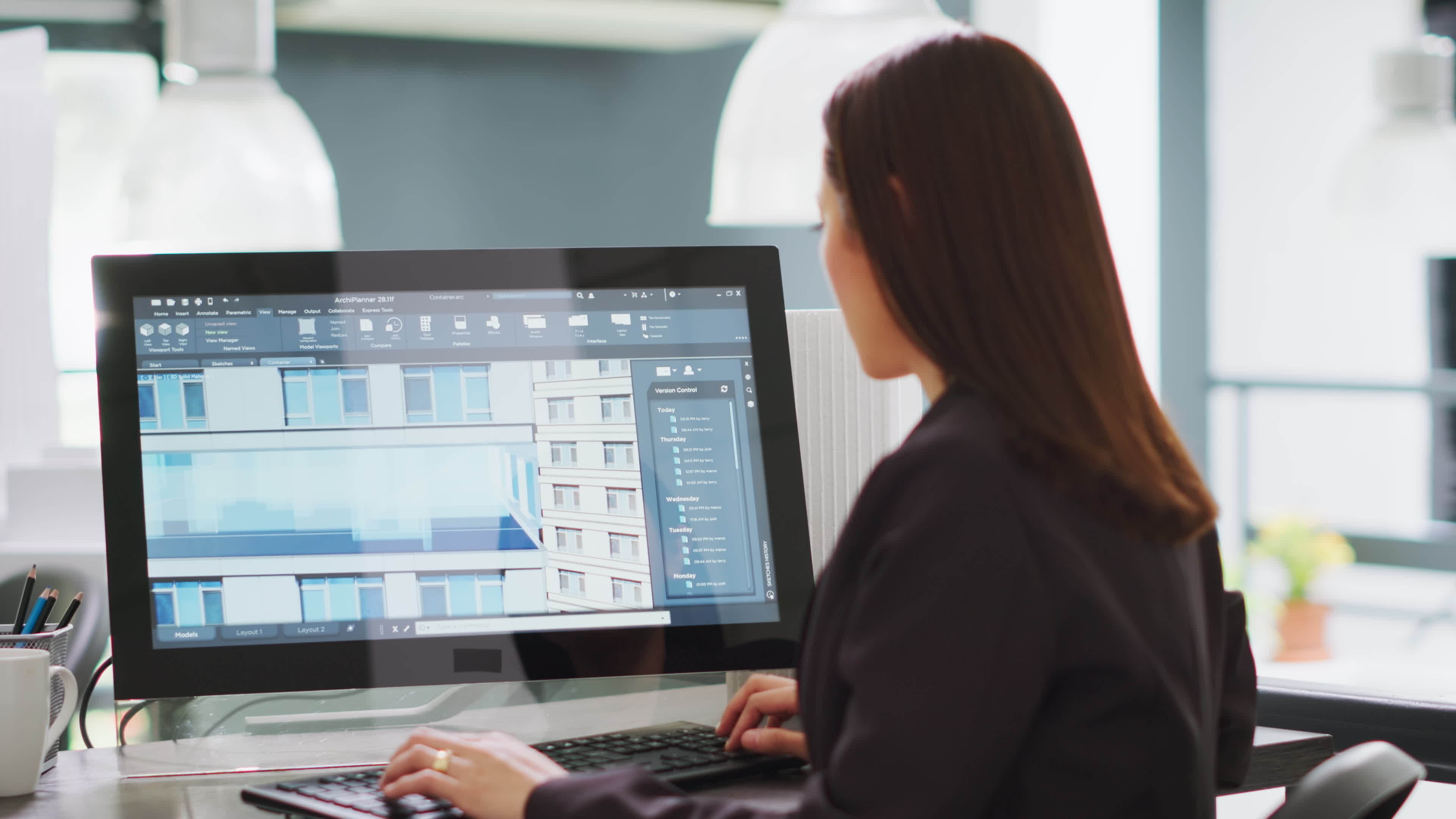 Creative developer designing building models on 3d software, working on ...