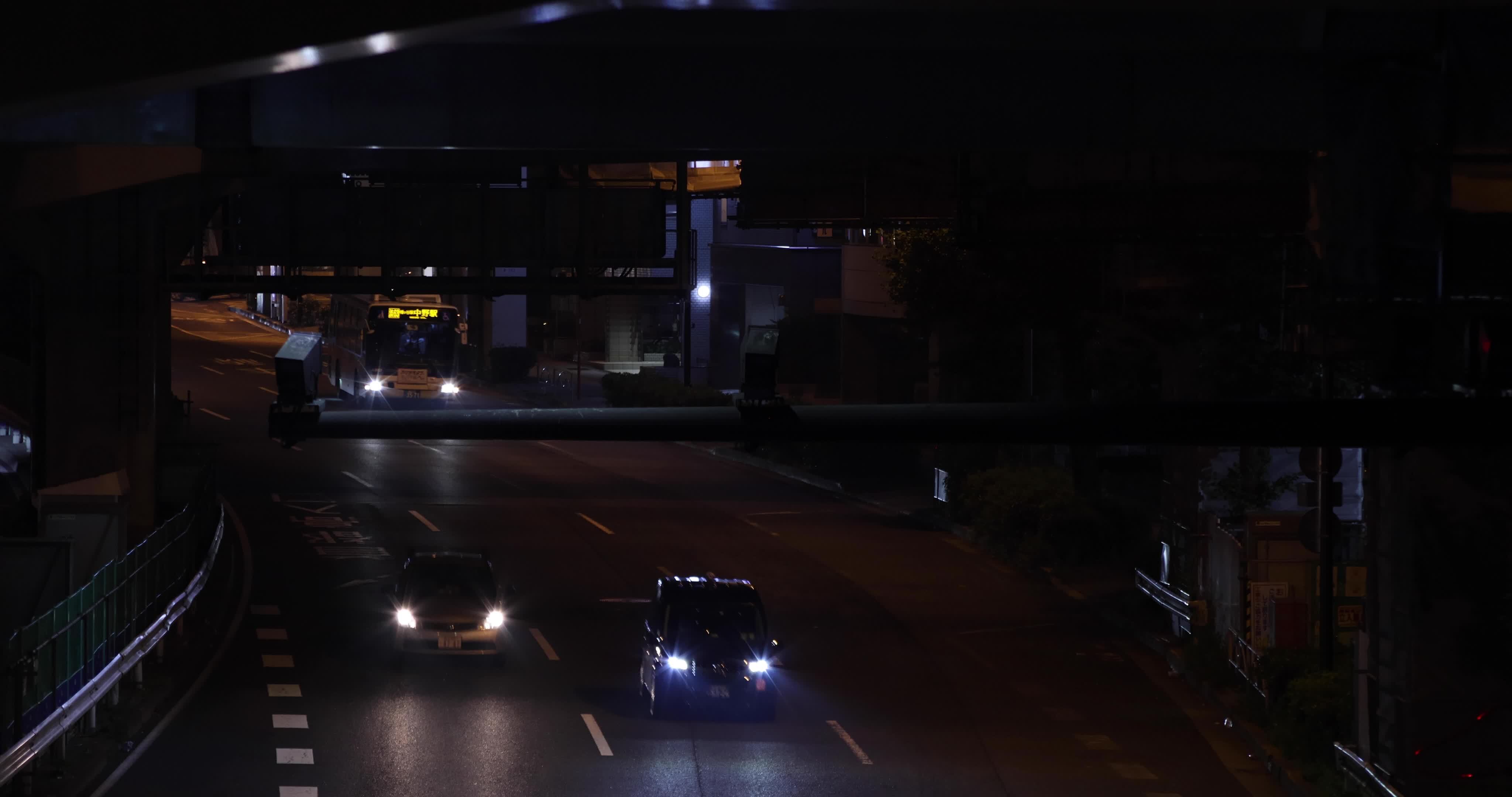 A night traffic jam at the city street in Tokyo telephoto shot 37927832 Stock Video at Vecteezy