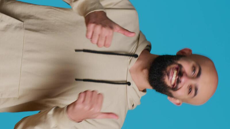 Vertical Video Middle eastern person giving thumbs up on camera ... Vertical Video Middle eastern person giving thumbs up on camera ...