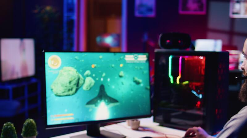 Smiling Gamer Restarting Game After Losing Mission While Playing Spaceship Videogame Feeling