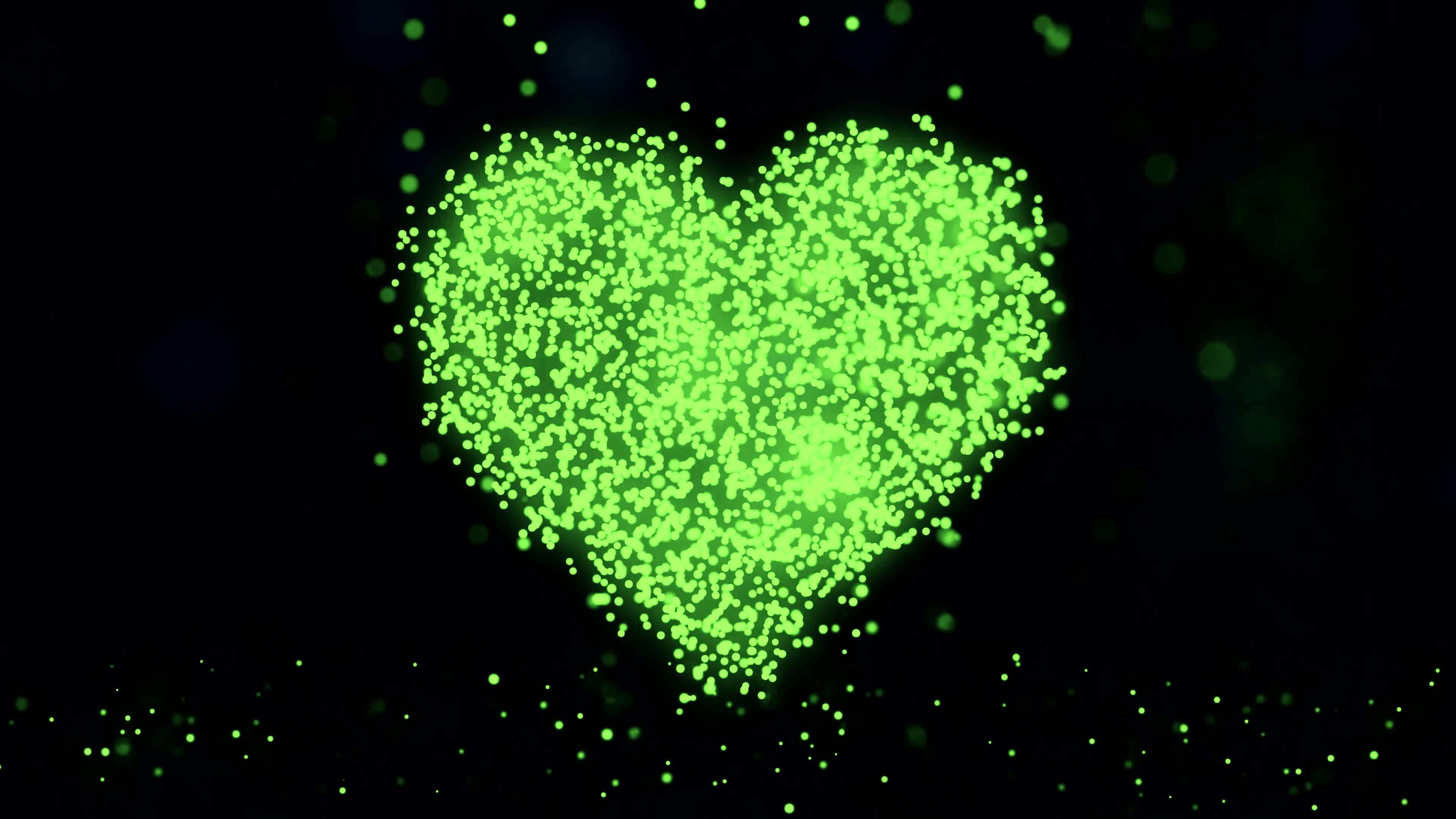 Animation of flying flickering particles form a heart sign or like ...