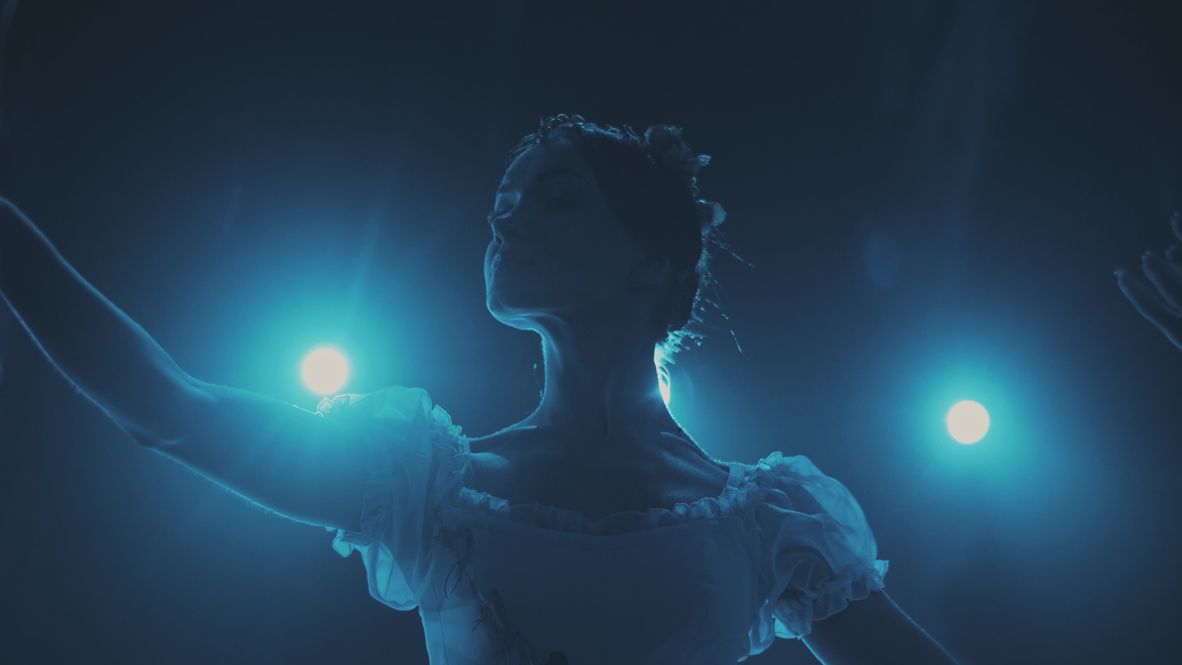 Cinematic Shot Of Beautiful Ballerina In Ballet Dress Standing In Theater Hall And Preparing To