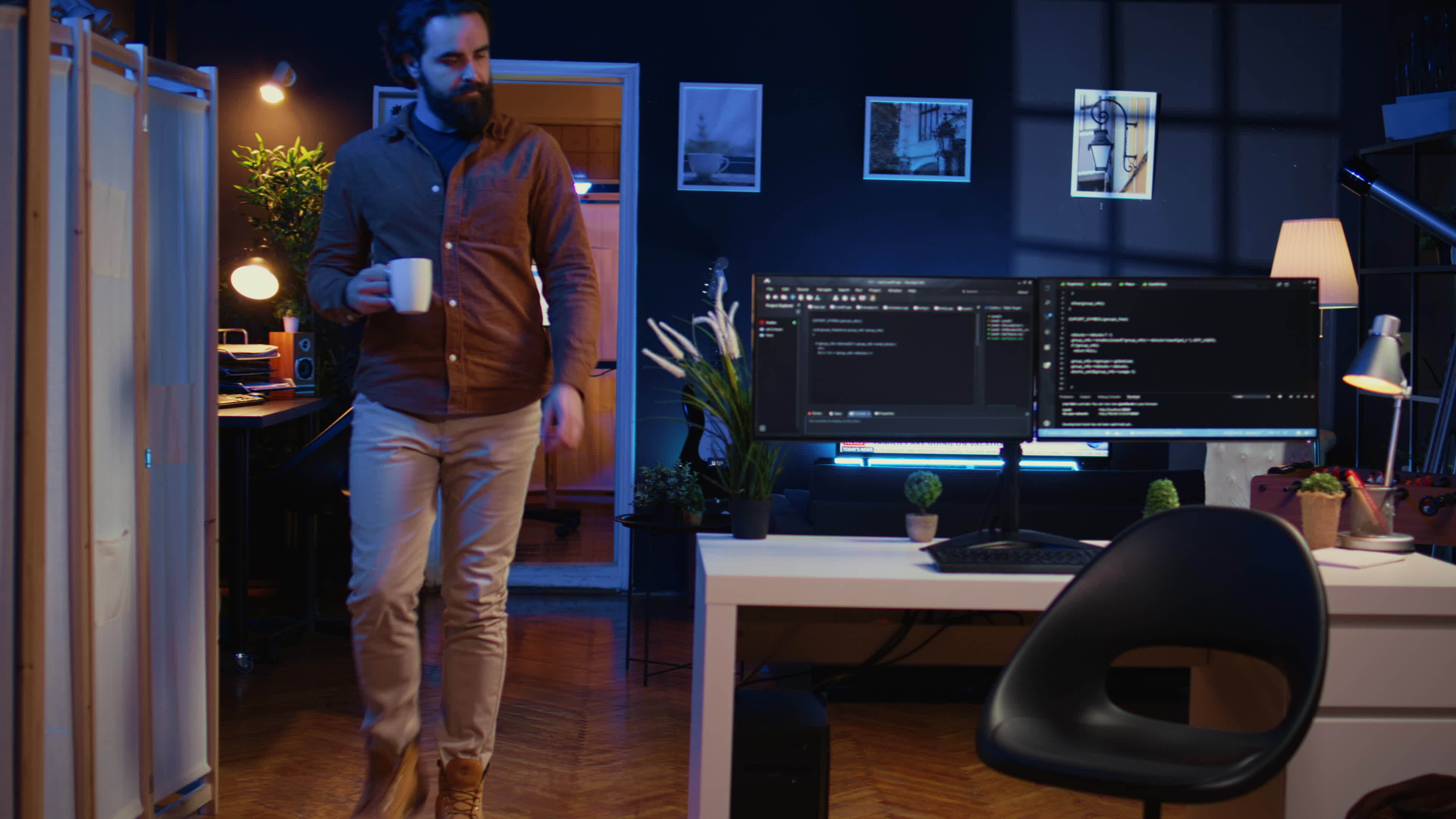 Developer arriving in apartment office with coffee mug in hand, ready ...