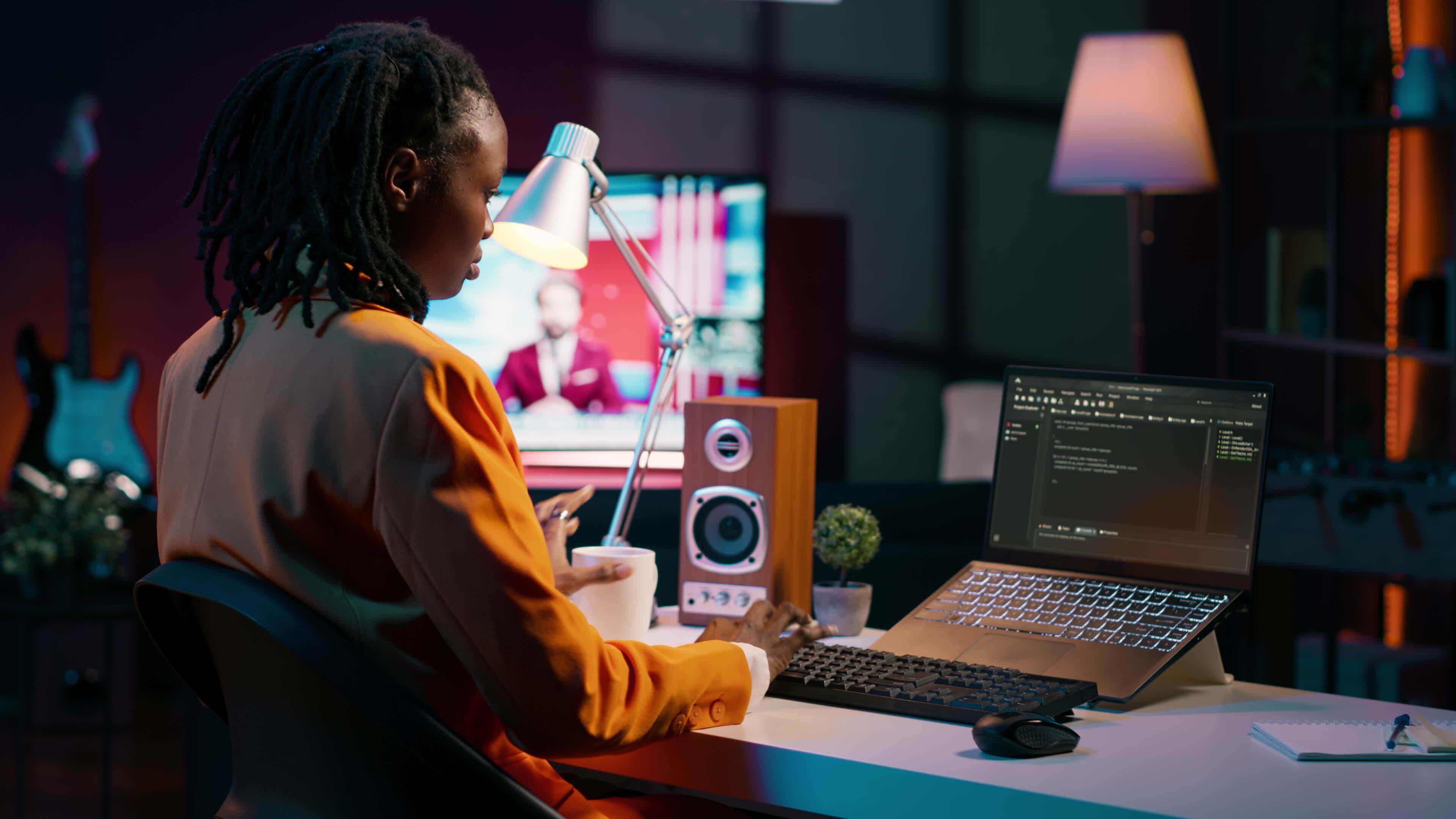 College student learning about outsourcing with html script, enjoying e learning and online ...