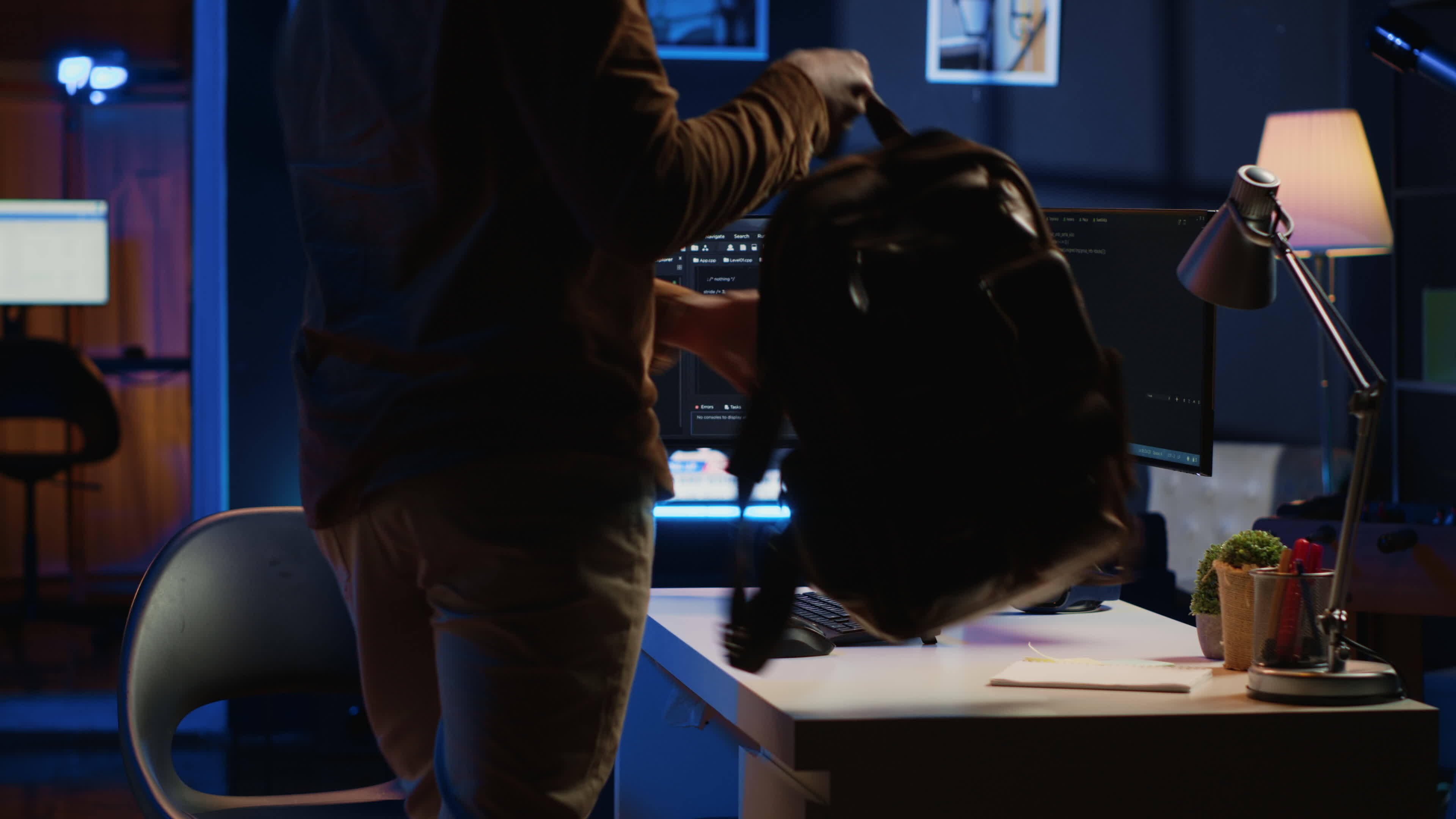 Freelancing software programmer arriving in personal office at home ...