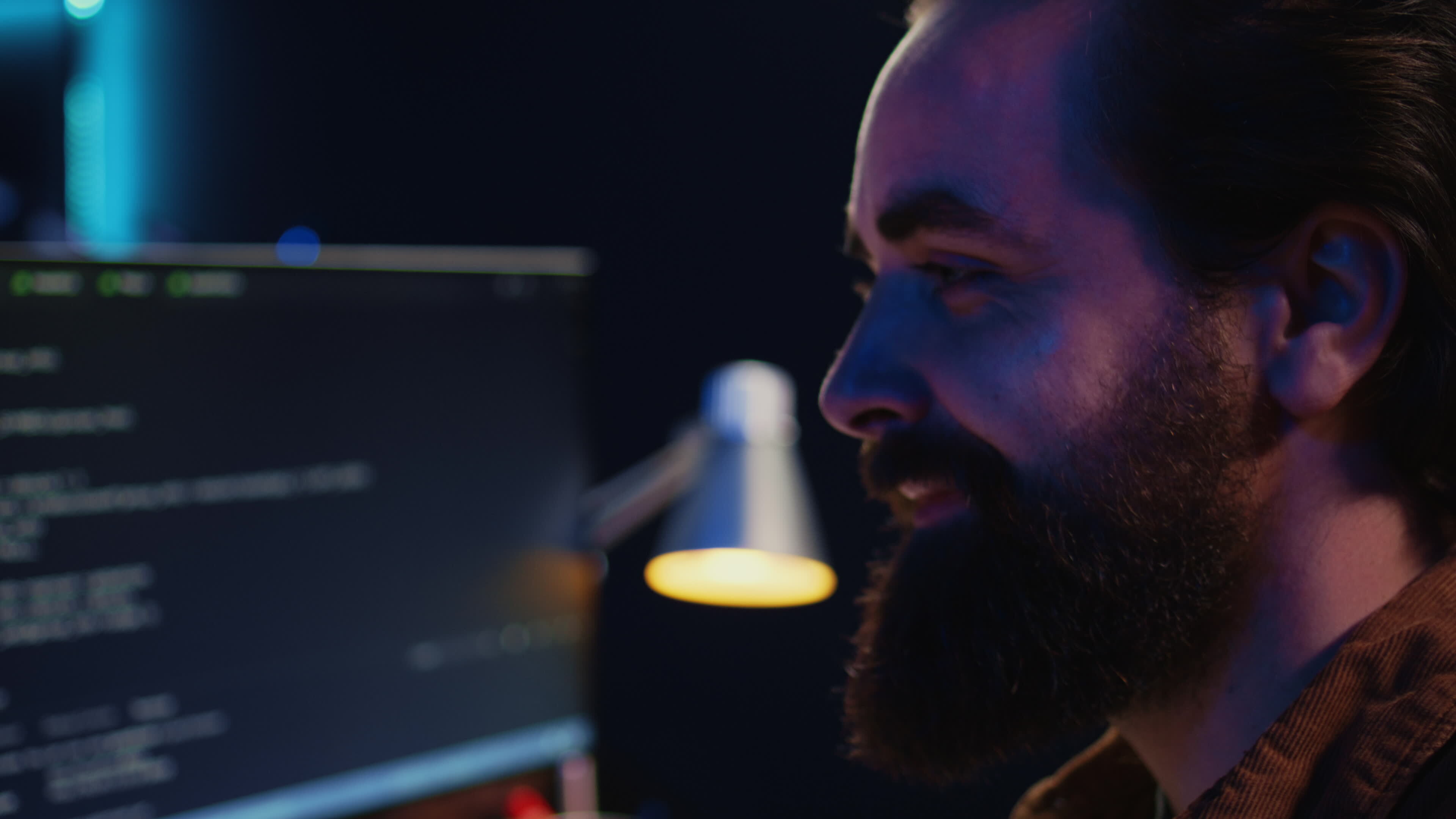 Joyous Remotely Working Programmer In Home Office Doing Coding On Computer At Desk Upbeat