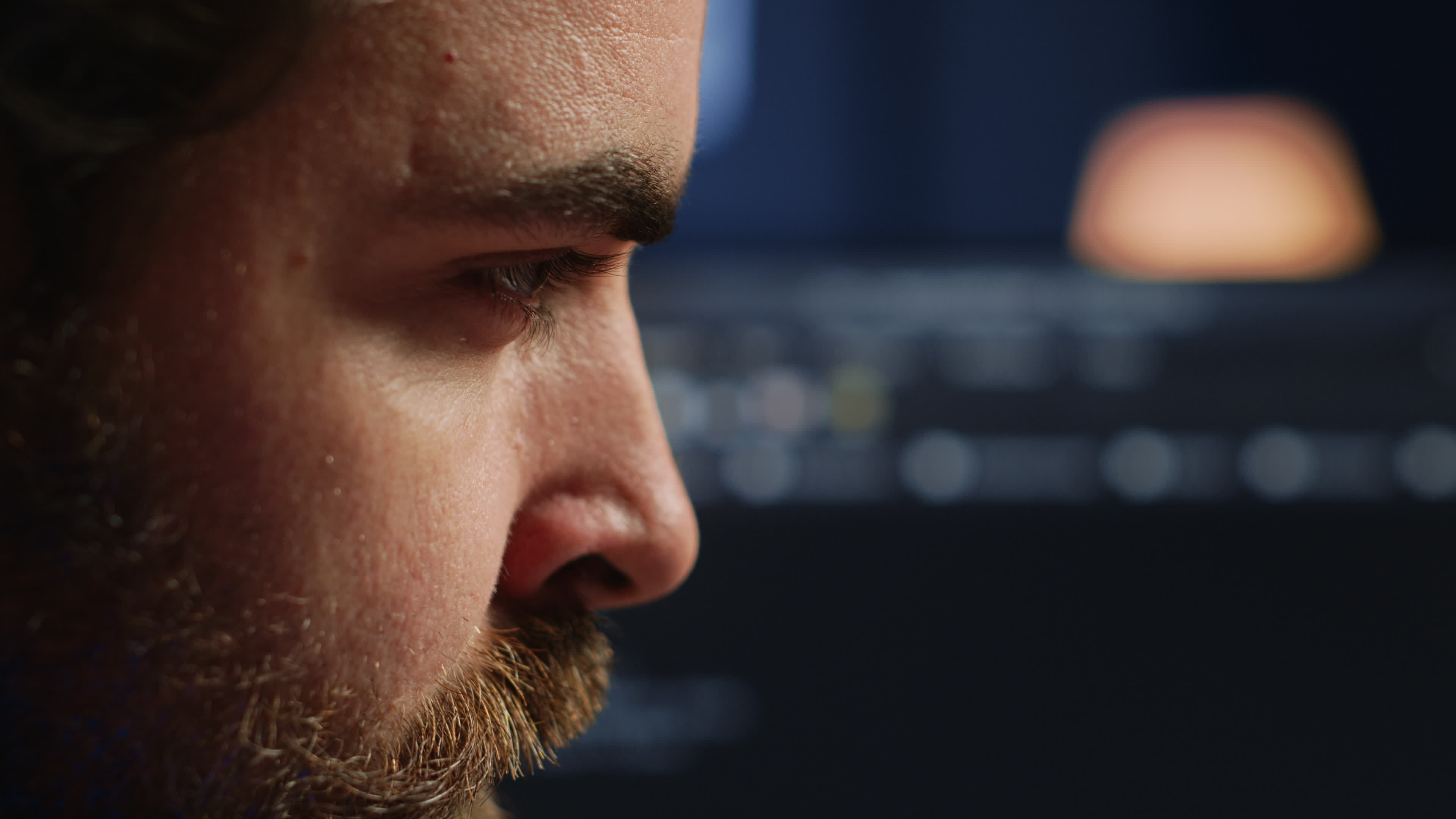 Developer in home office concentrating hard while doing coding on ...