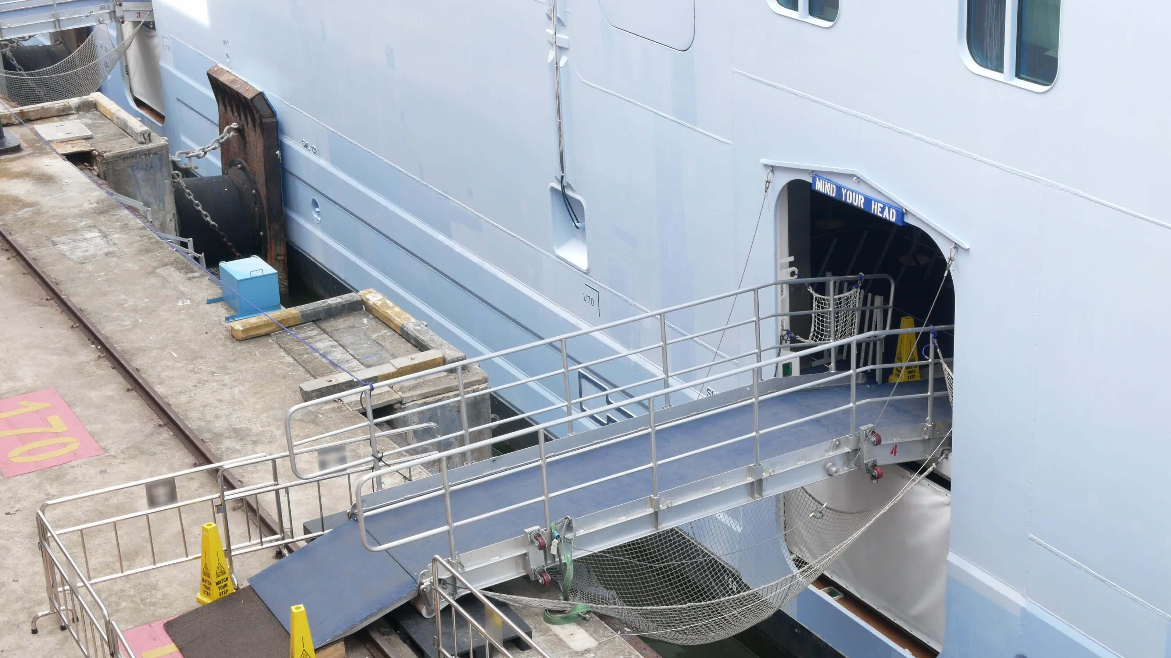 view to the gangway boarding bridge to the passenger cruise ship area ... view to the gangway boarding bridge to the passenger cruise ship area ...