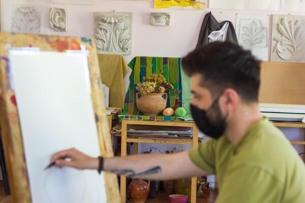 Artist Working Stock Photos, Images and Backgrounds for Free Download