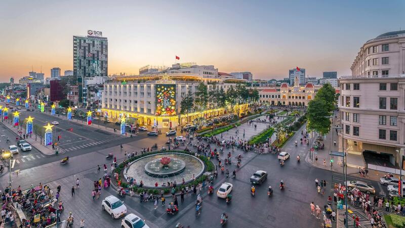 Cityscape view of Nguyen Hue Walking Street, Ho Chi Minh city, Vietnam. Beautiful night view ...