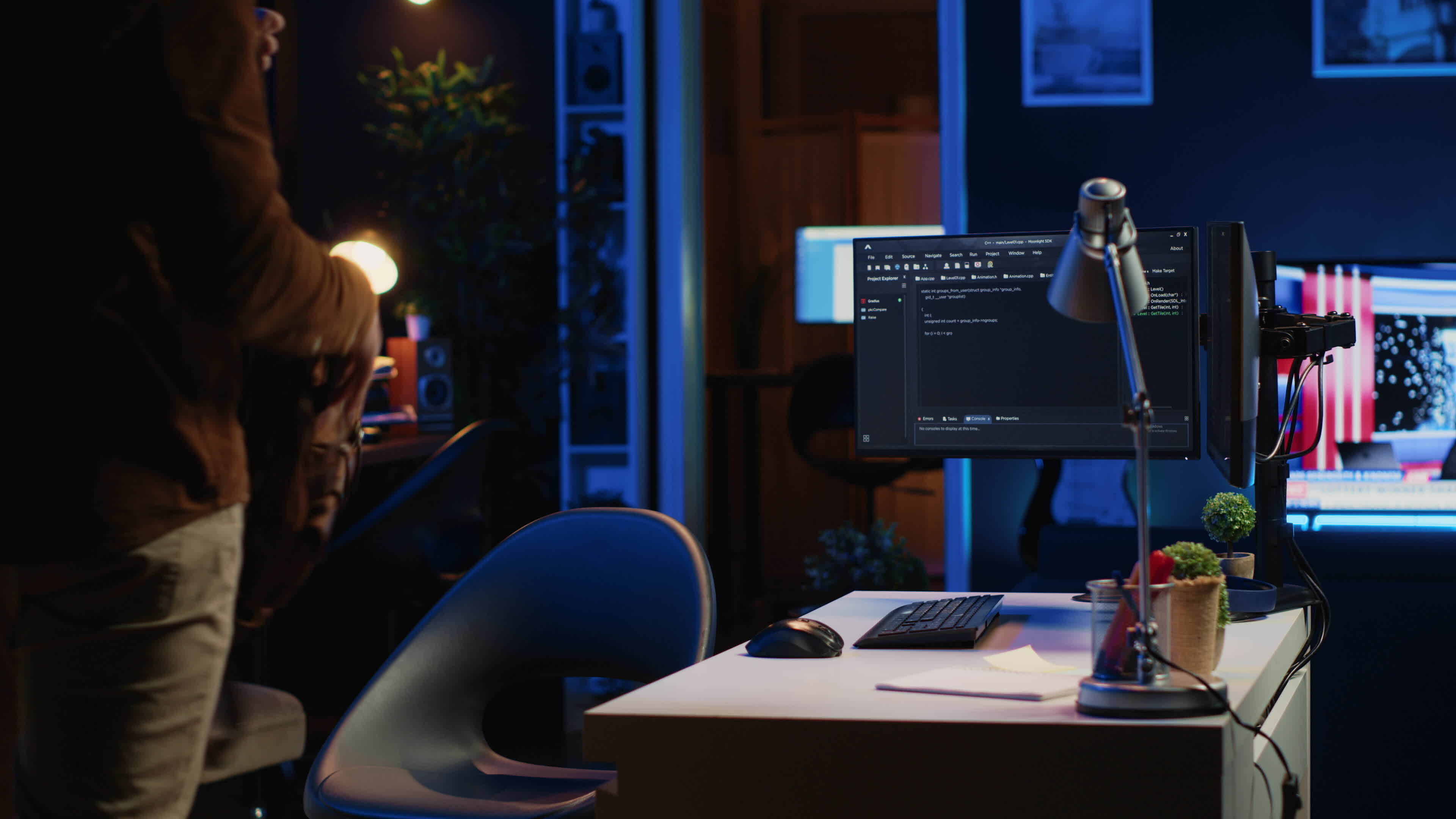 Freelancing system administrator arriving in personal office at home ...