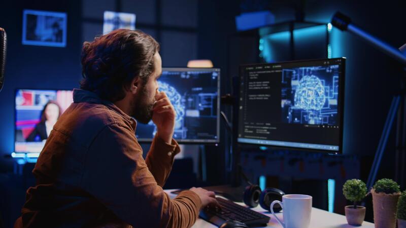 Programmer Using Computer To Update Artificial Intelligence Neural Networks Drinking Coffee And