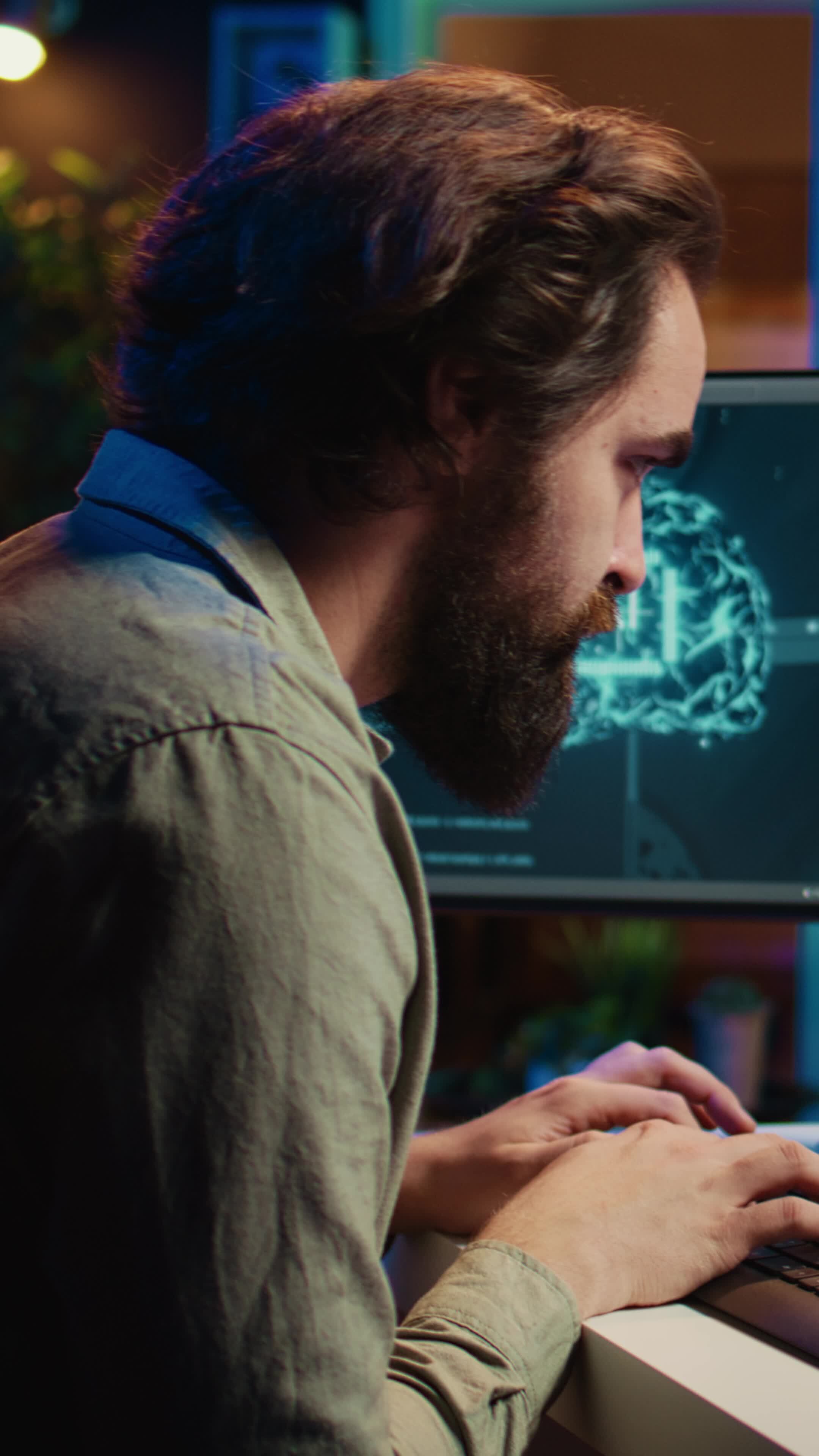 Vertical video Computer engineer updating artificial intelligence ... Vertical video Computer engineer updating artificial intelligence ...
