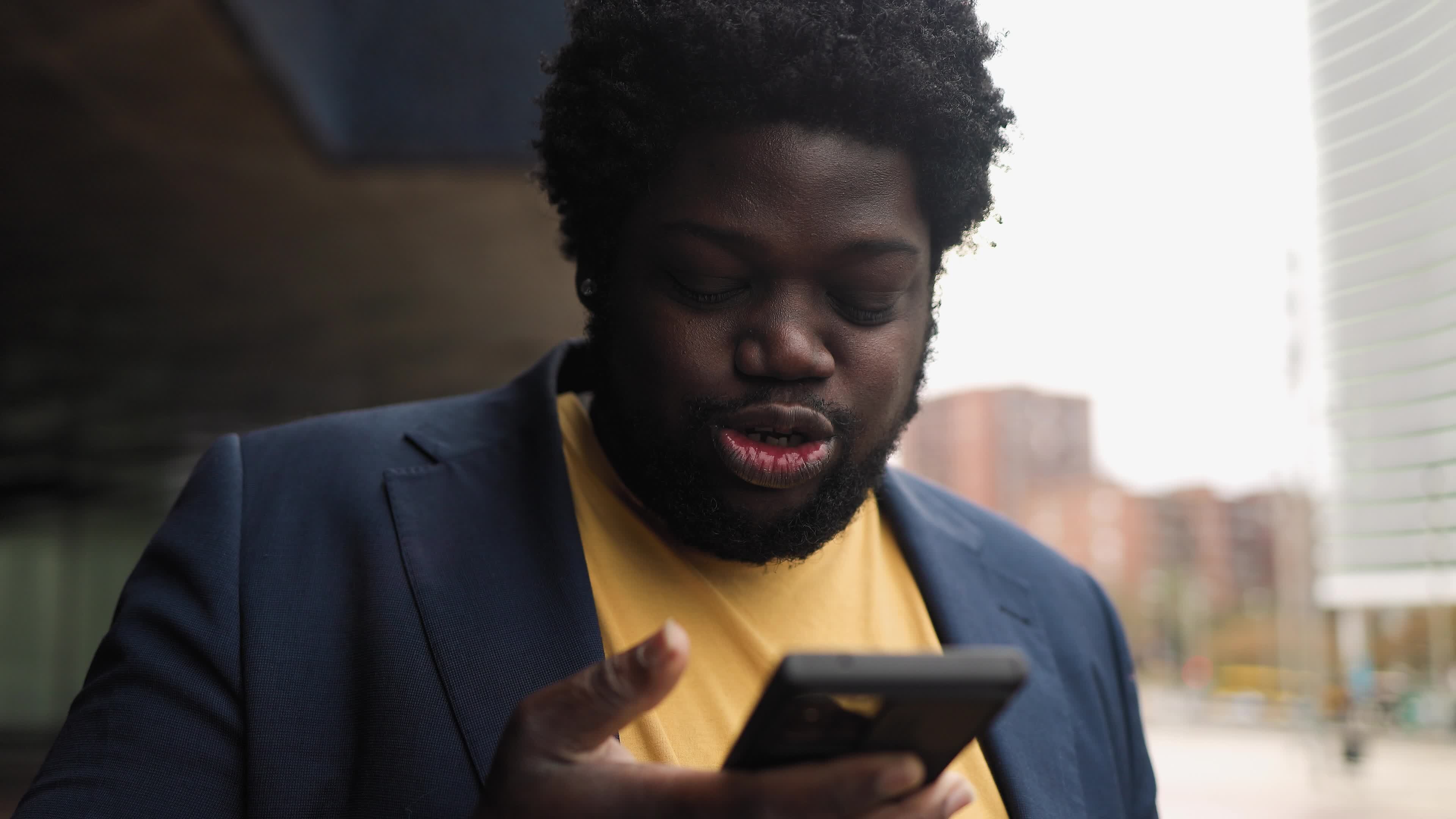 Man Scrolling Phone Stock Video Footage for Free Download