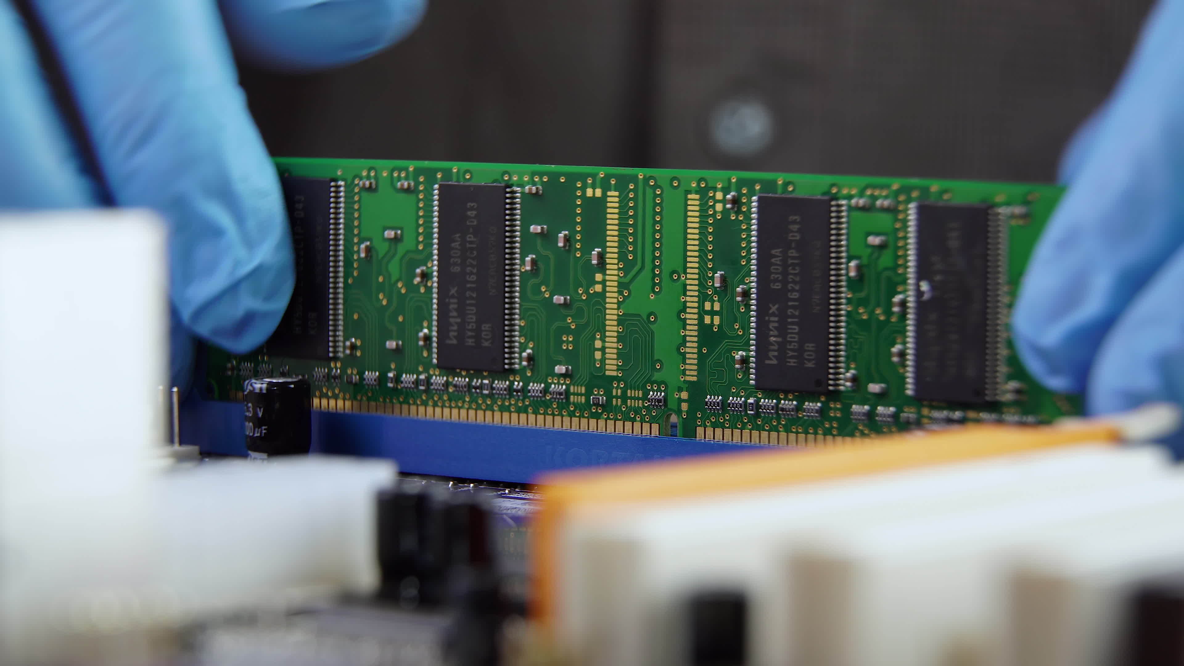 High Tech The Process Of Installing Ram On A Computer Motherboard