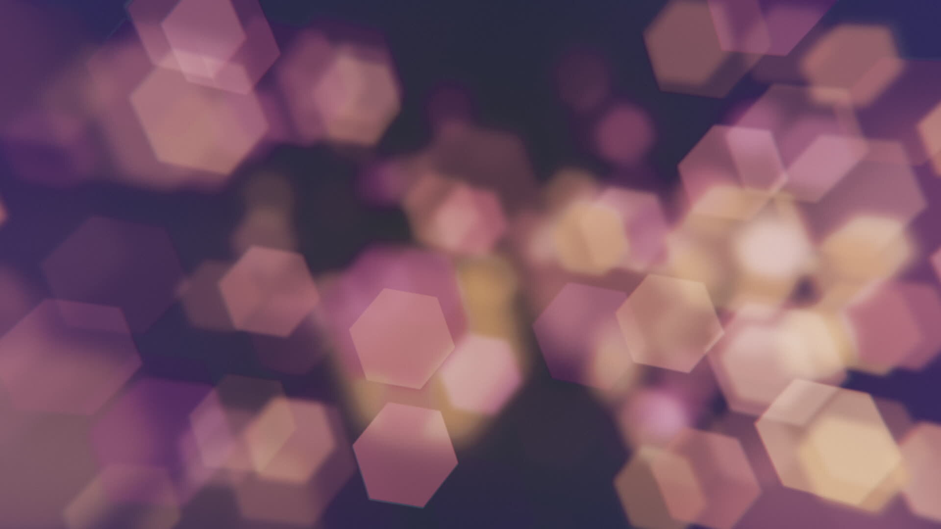 Abstract bokeh background animation with gently flickering defocused warm bokeh light hexagons ...