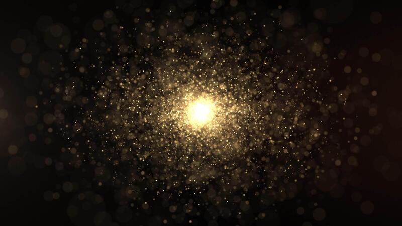 Abstract background of golden glitter particles. Beautiful bokeh and glowing dust. Luxurious ...