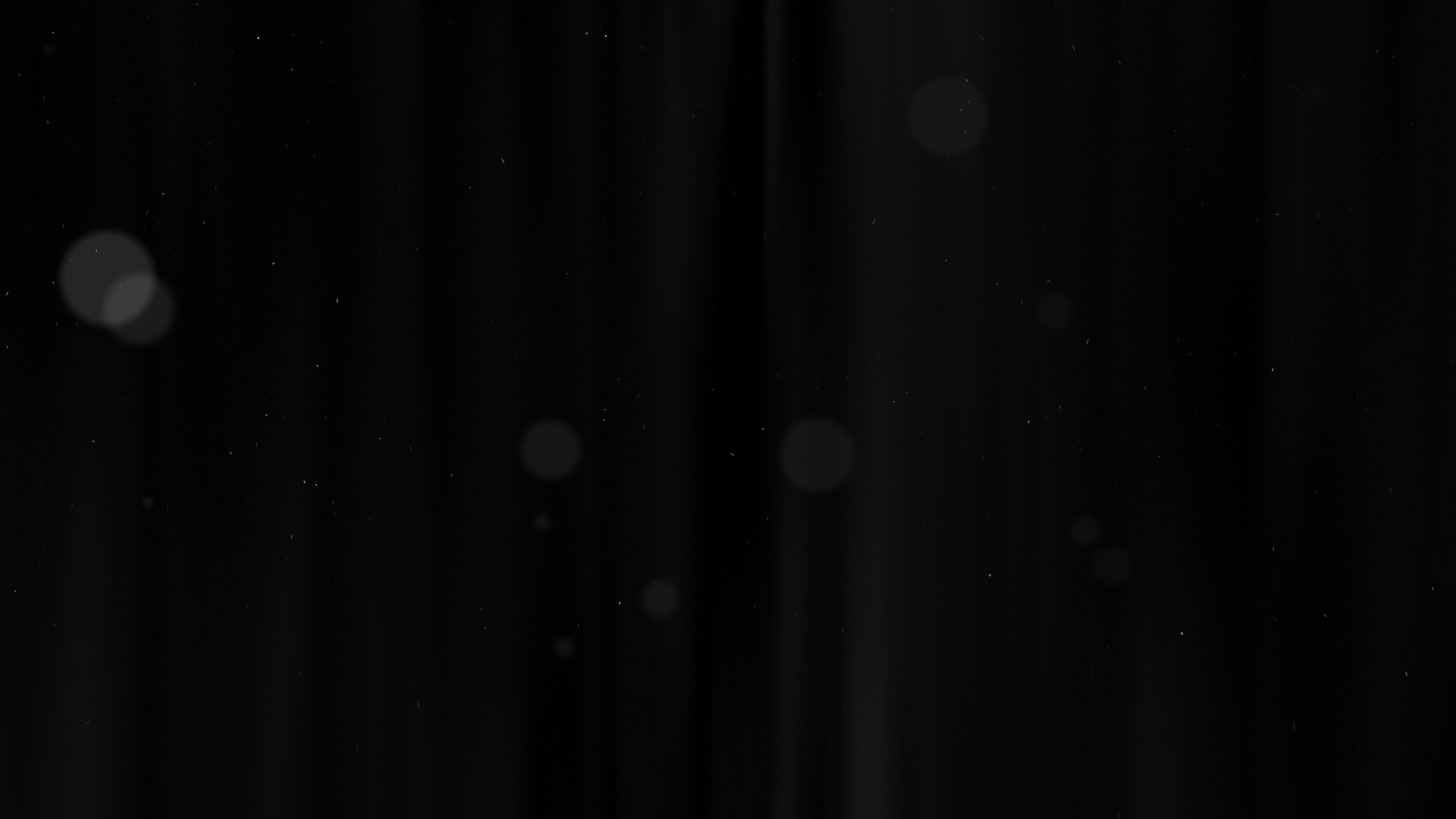 Real dust particles flying in the air. Background of dust particles and beautiful bokeh. Slow ...