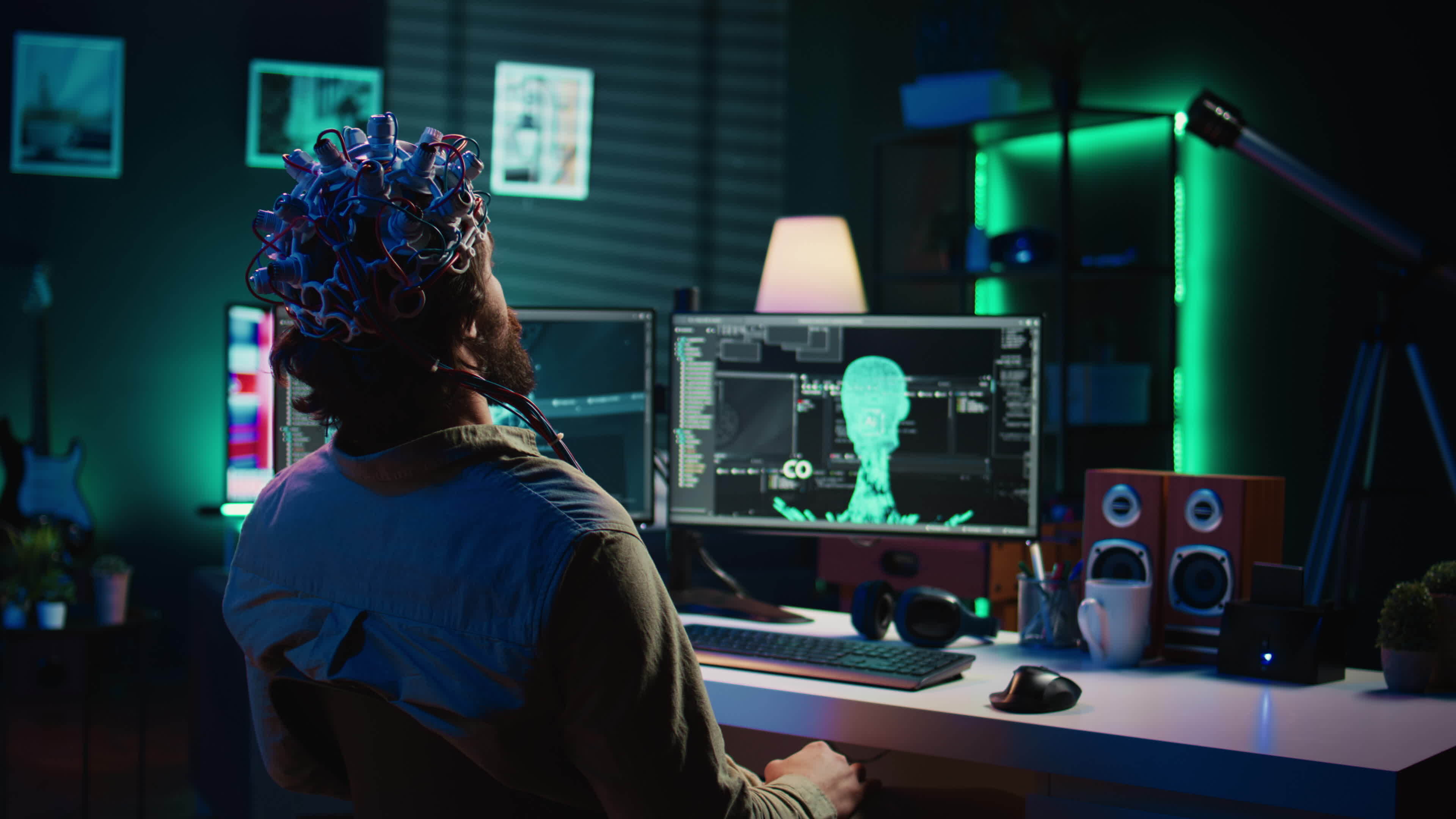 Engineer With Eeg Headset On Programming Brain Transfer Into Computer