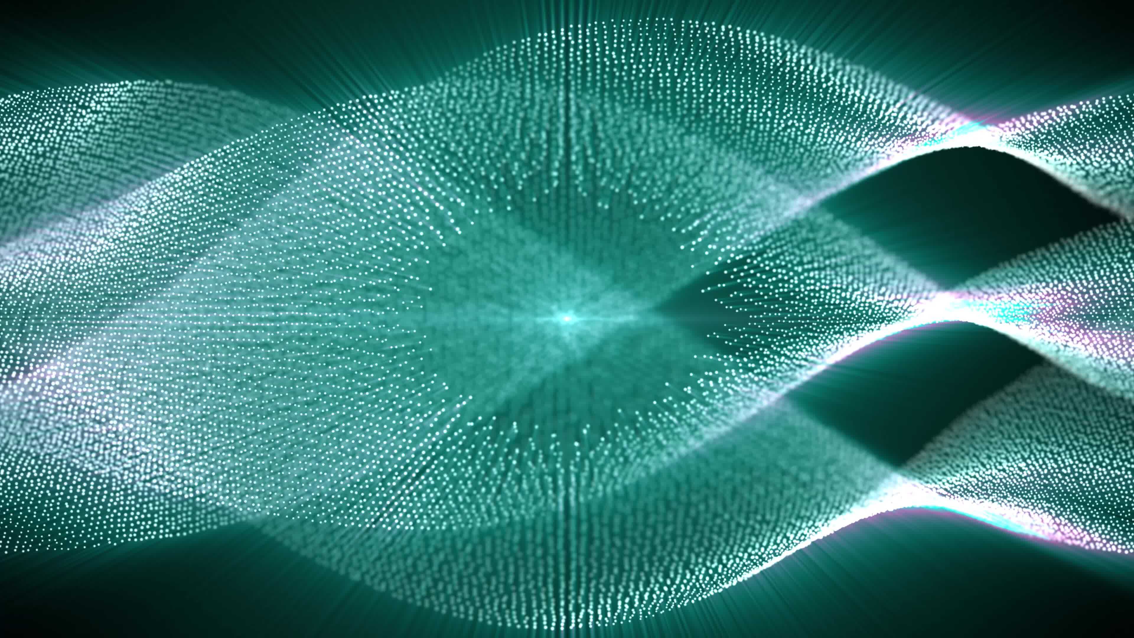 Looping abstract animation of glowing blue green particle waves with a circular field around a ...