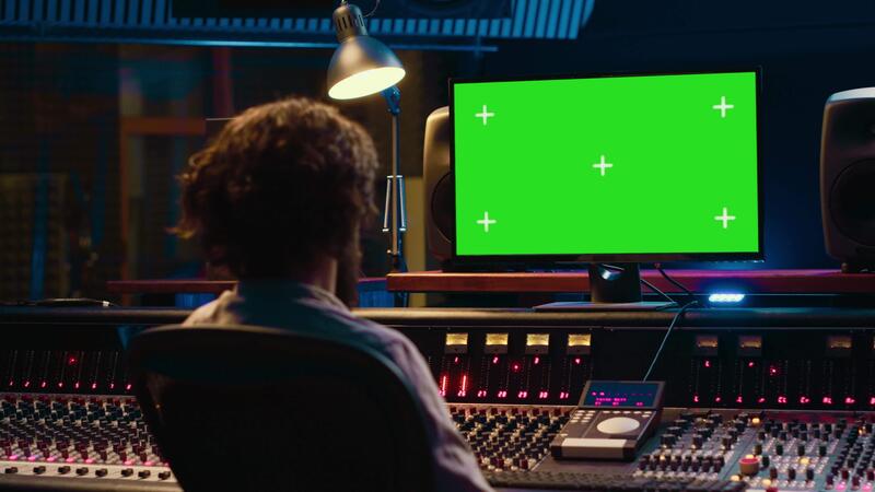 Tracking engineer watching tutorials online to learn mixing and ...